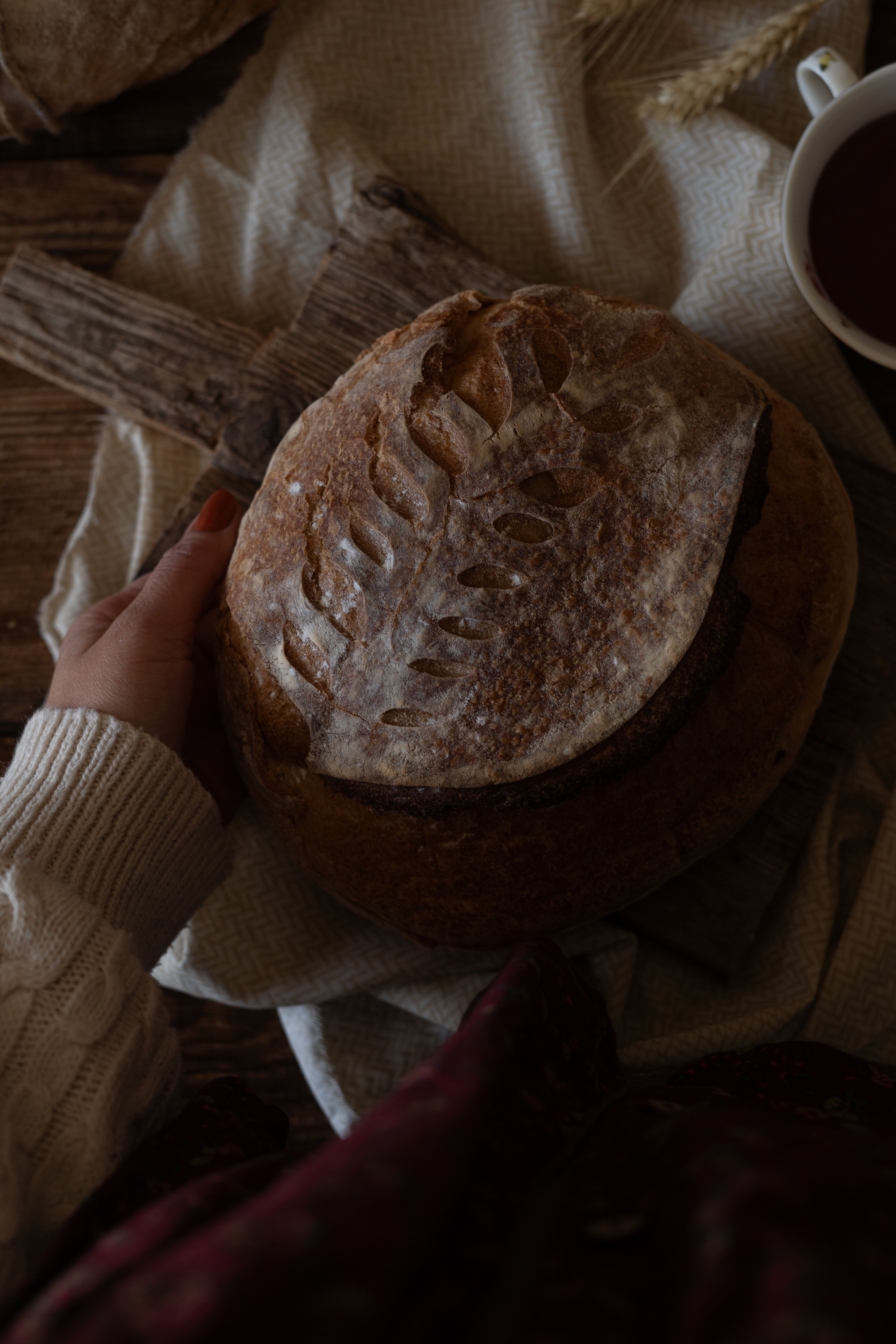 Rustic Artisan Bread with Leaf Pattern · Free Stock Photo