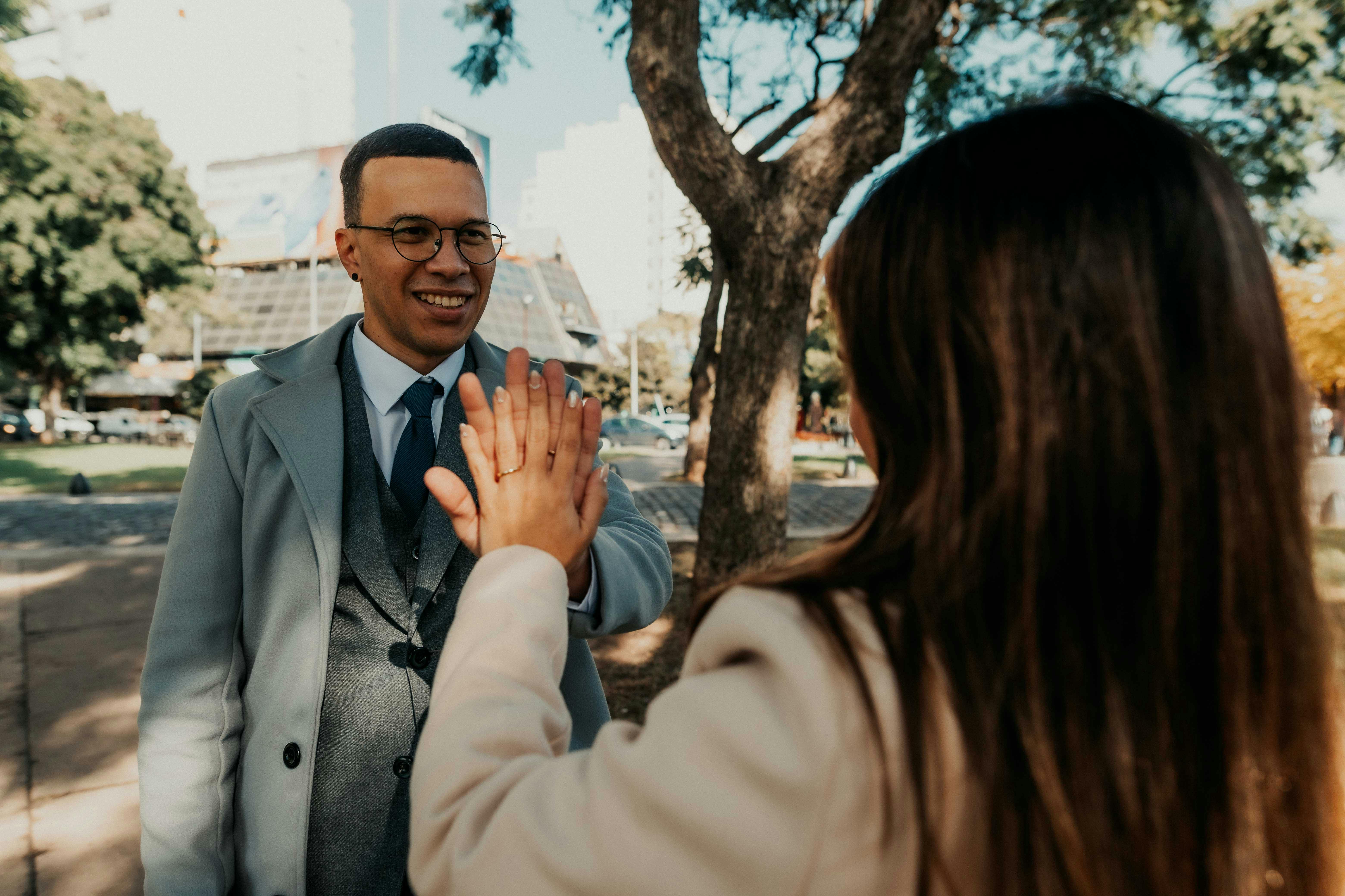 Outdoor High-Five in Buenos Aires Park · Free Stock Photo