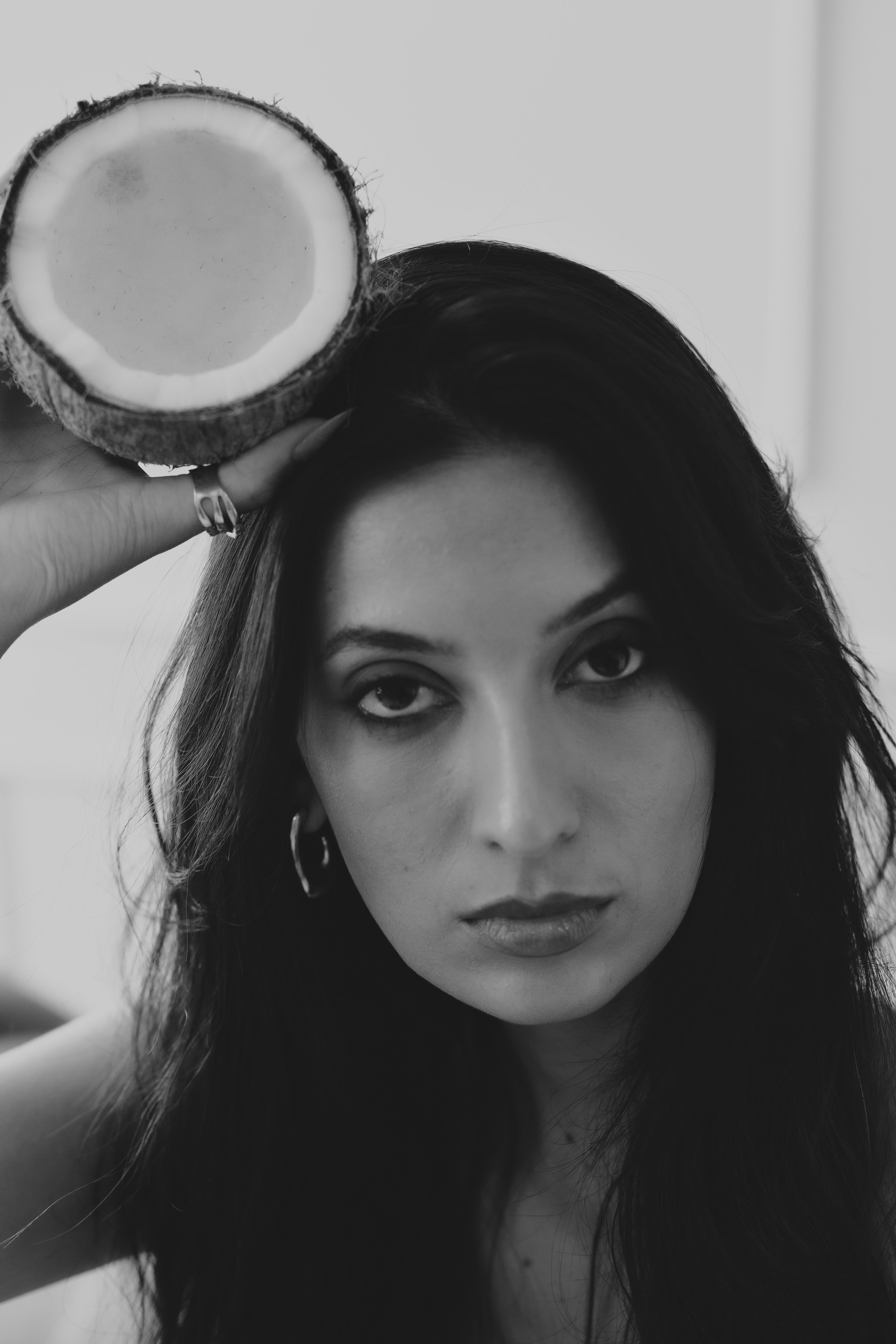 Artistic Portrait with Coconut in Black and White · Free Stock Photo