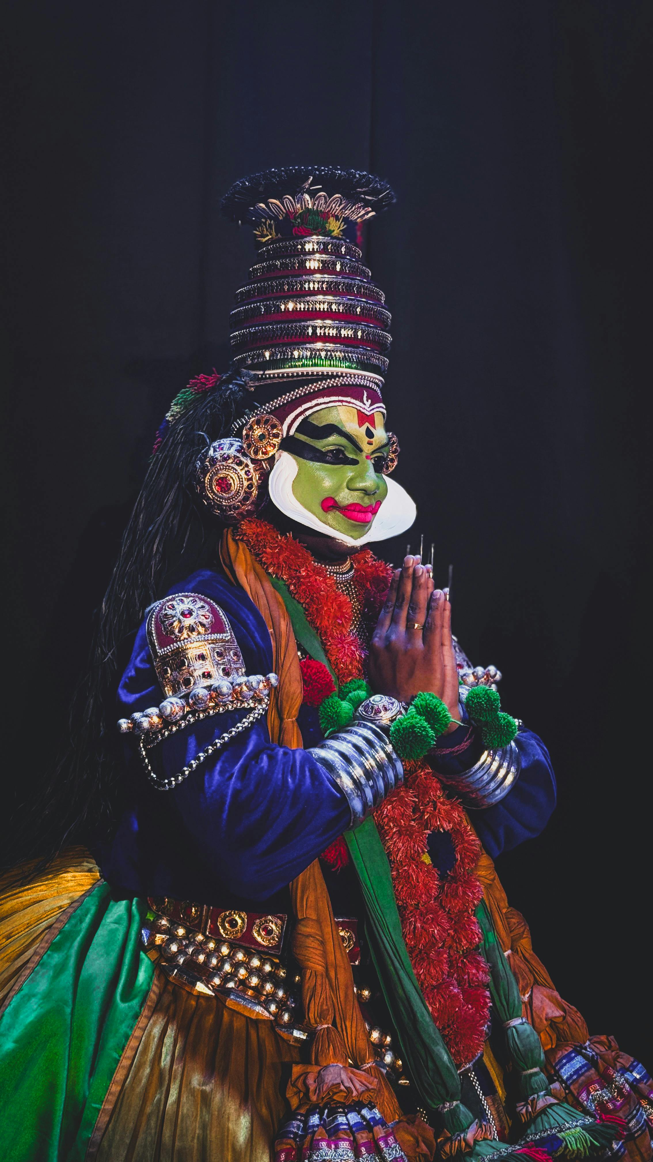 Vibrant Kathakali Performer in Traditional Costume · Free Stock Photo