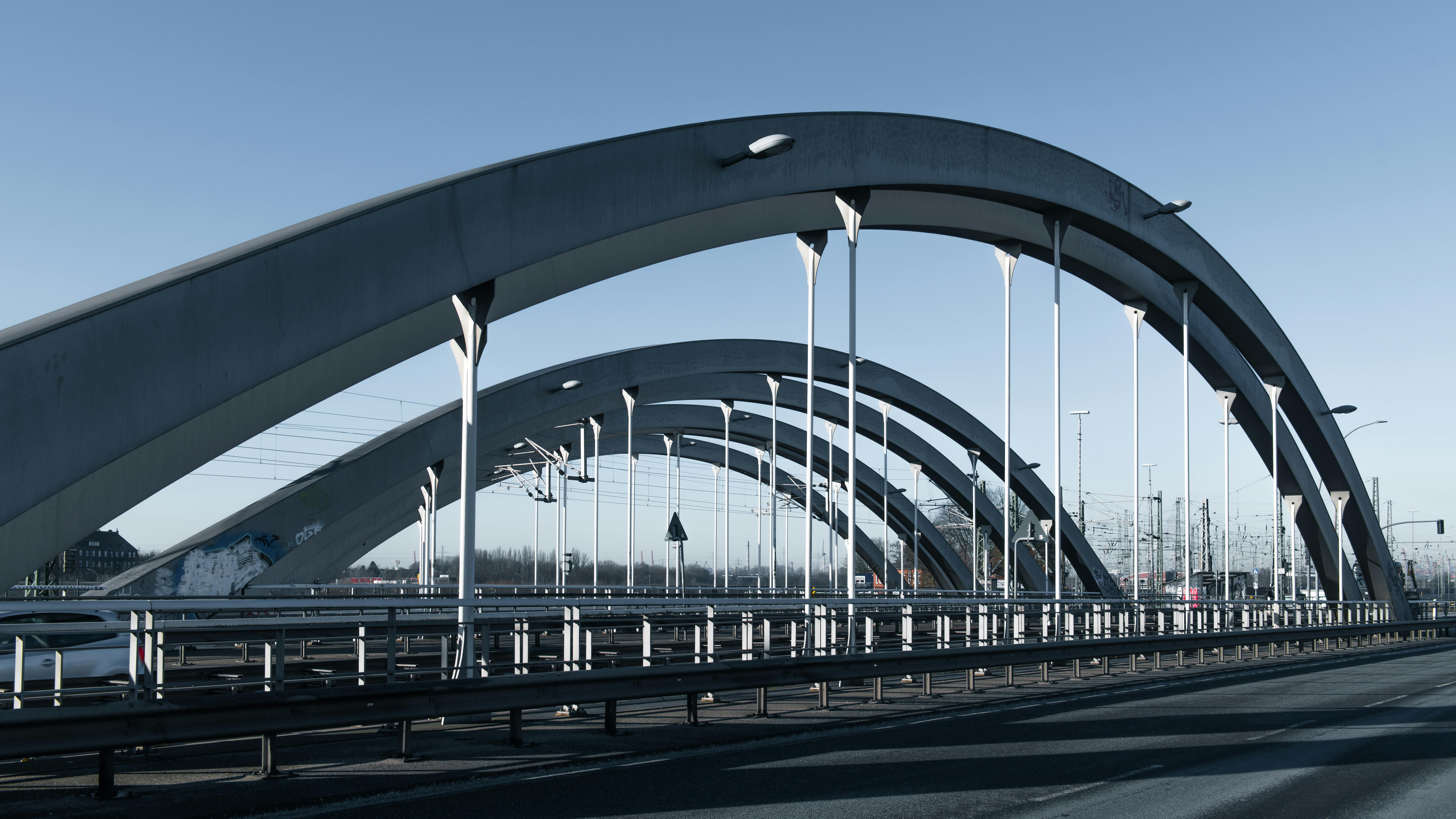 Modern Steel Arch Bridge in Hamburg · Free Stock Photo