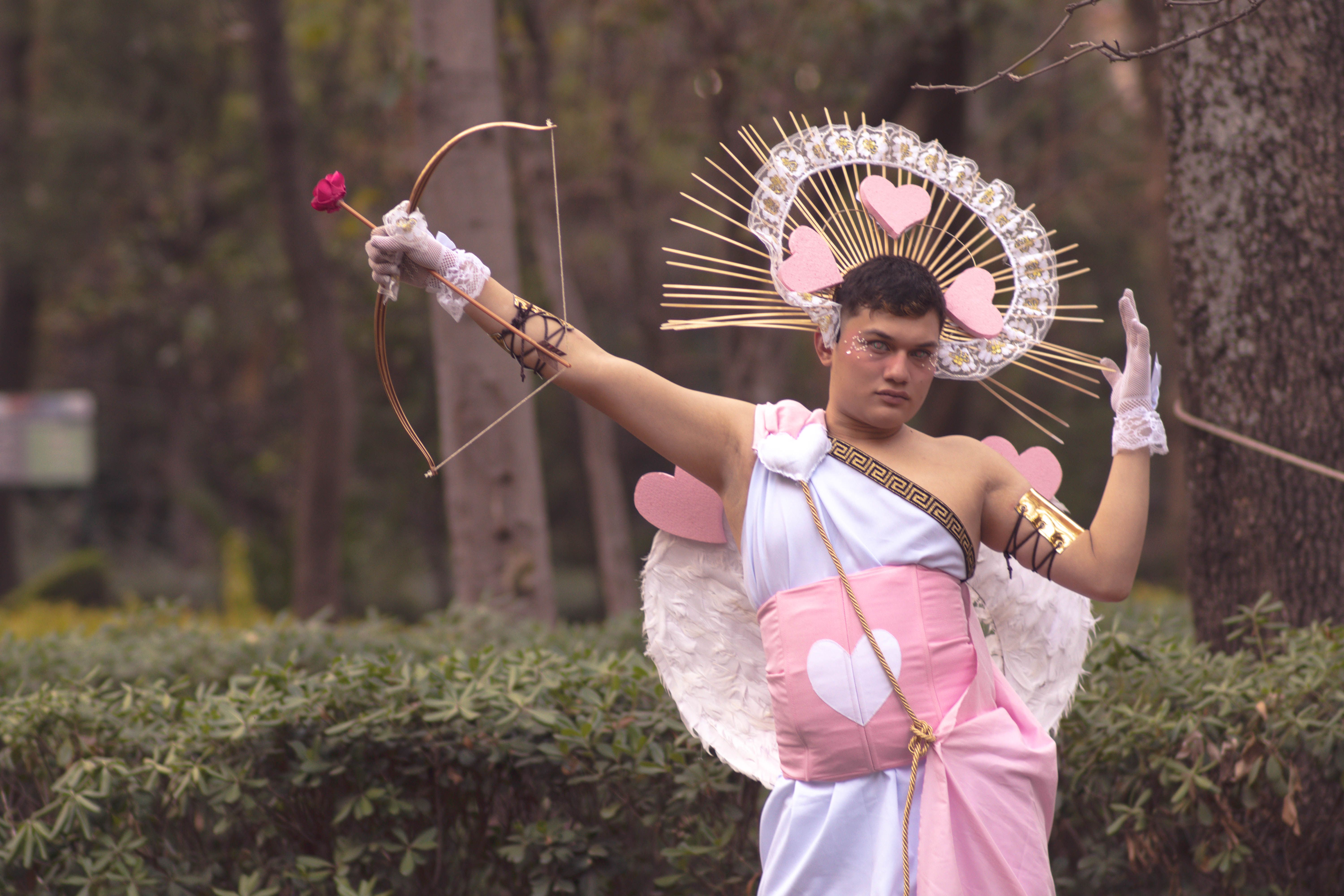 Creative Cupid Costume in Outdoor Setting · Free Stock Photo