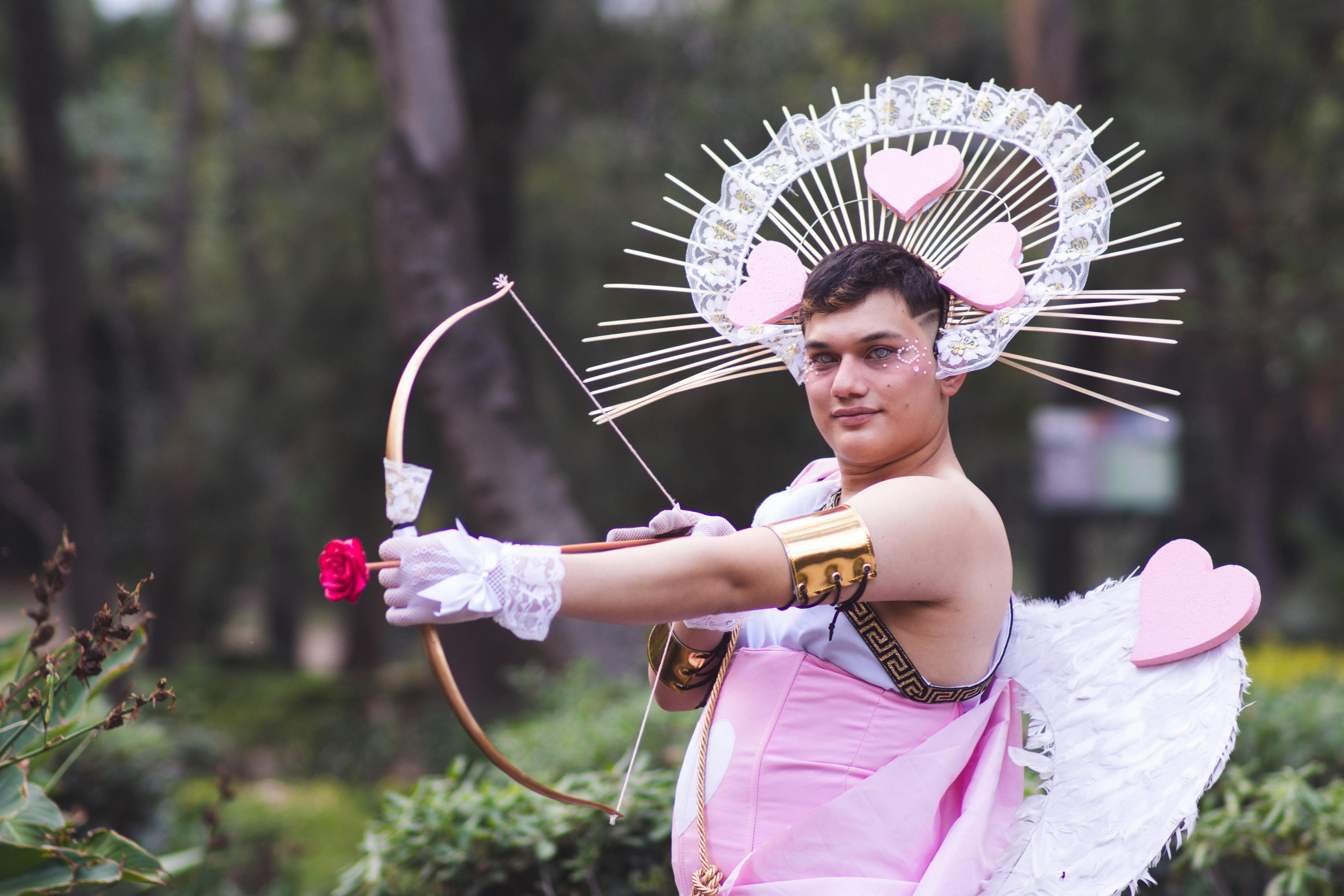 Cupid Cosplay Archer in Enchanted Forest · Free Stock Photo