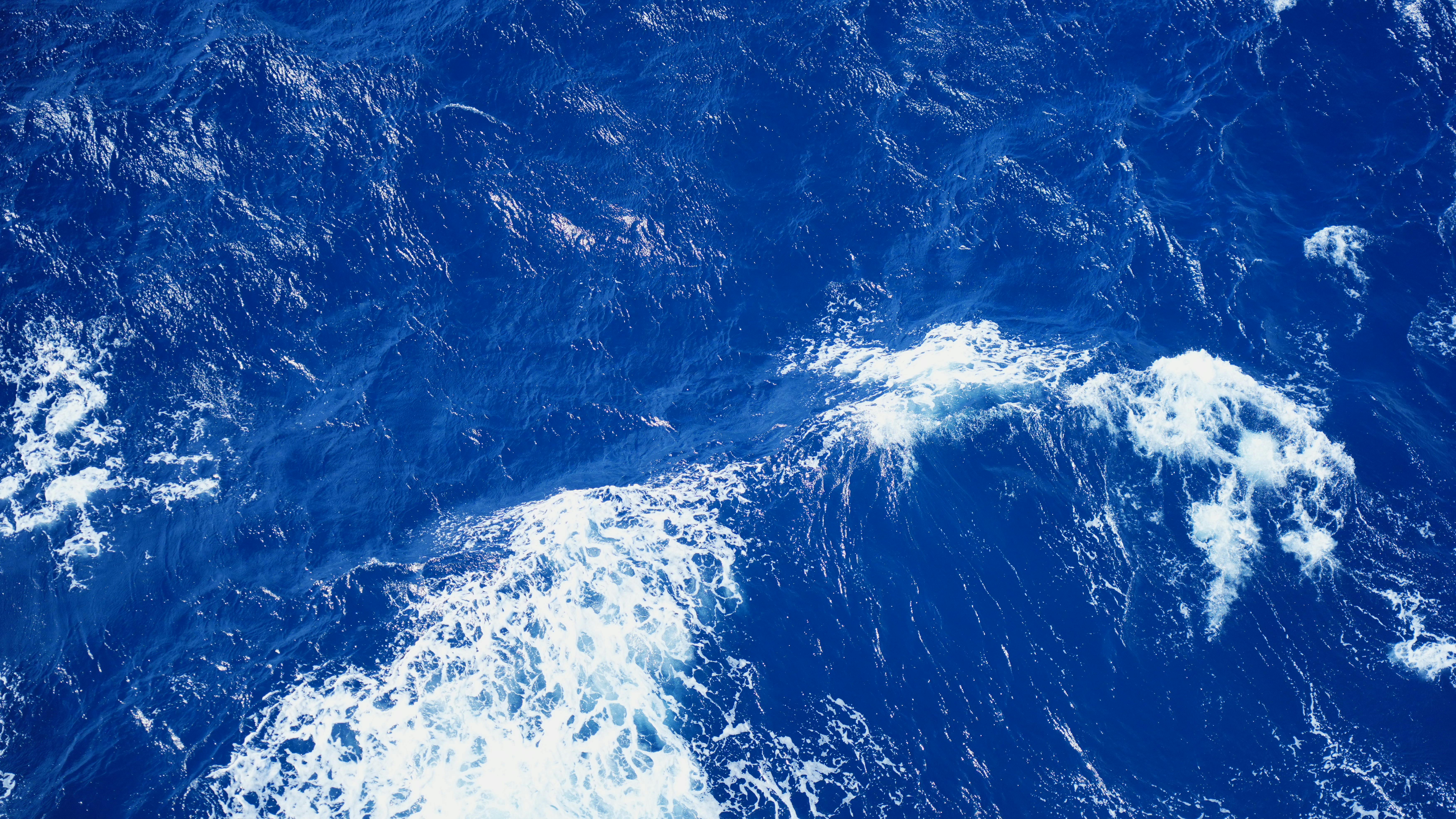 Aerial View of Deep Blue Ocean Waves · Free Stock Photo