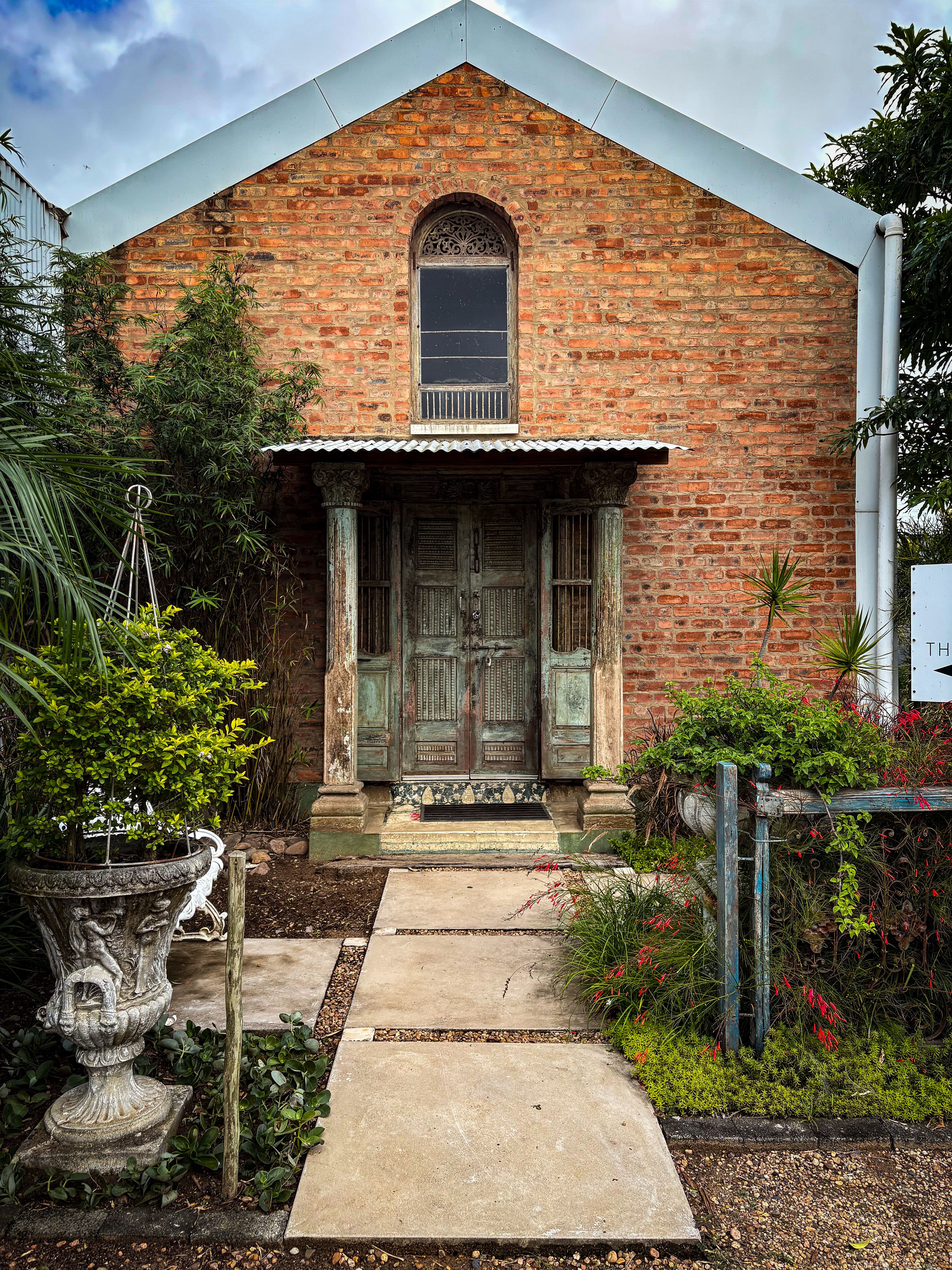 Charming Brick House with Vintage Doorway · Free Stock Photo