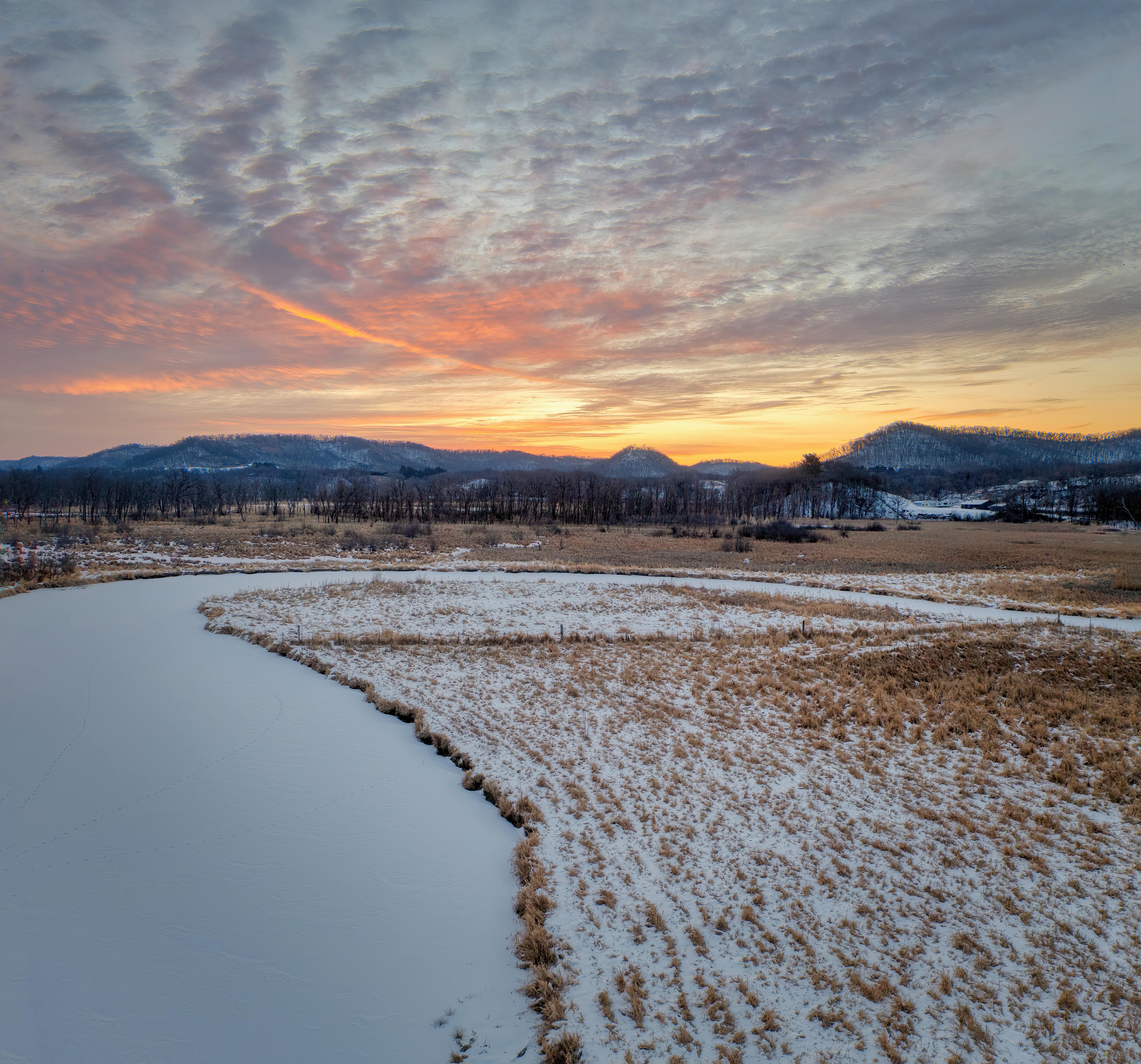 Winter sunset over snowy Wisconsin landscape · Free Stock Photo