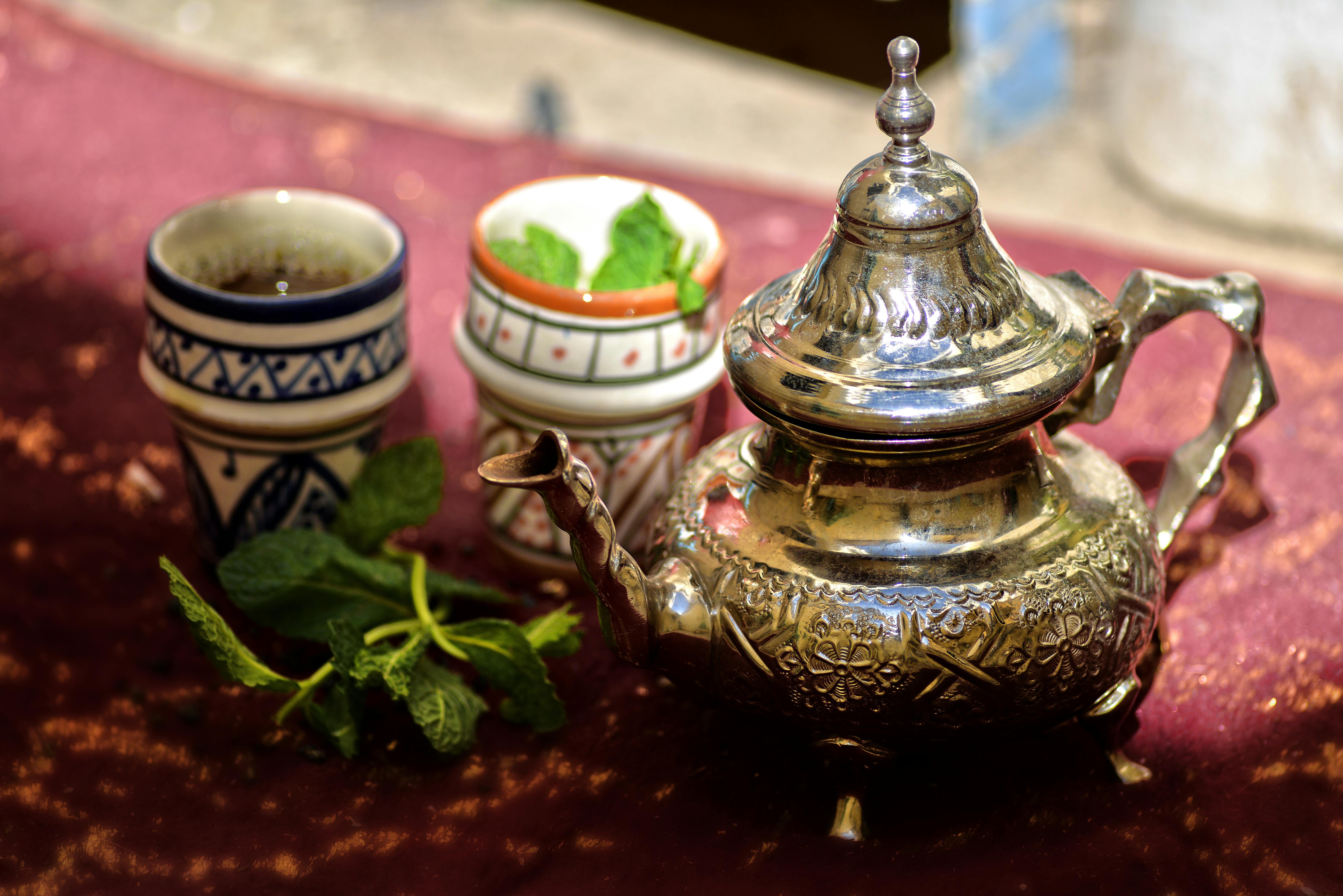 Traditional Moroccan Mint Tea Set in Sunlight · Free Stock Photo Traditional Moroccan Mint Tea Set in Sunlight · Free Stock Photo