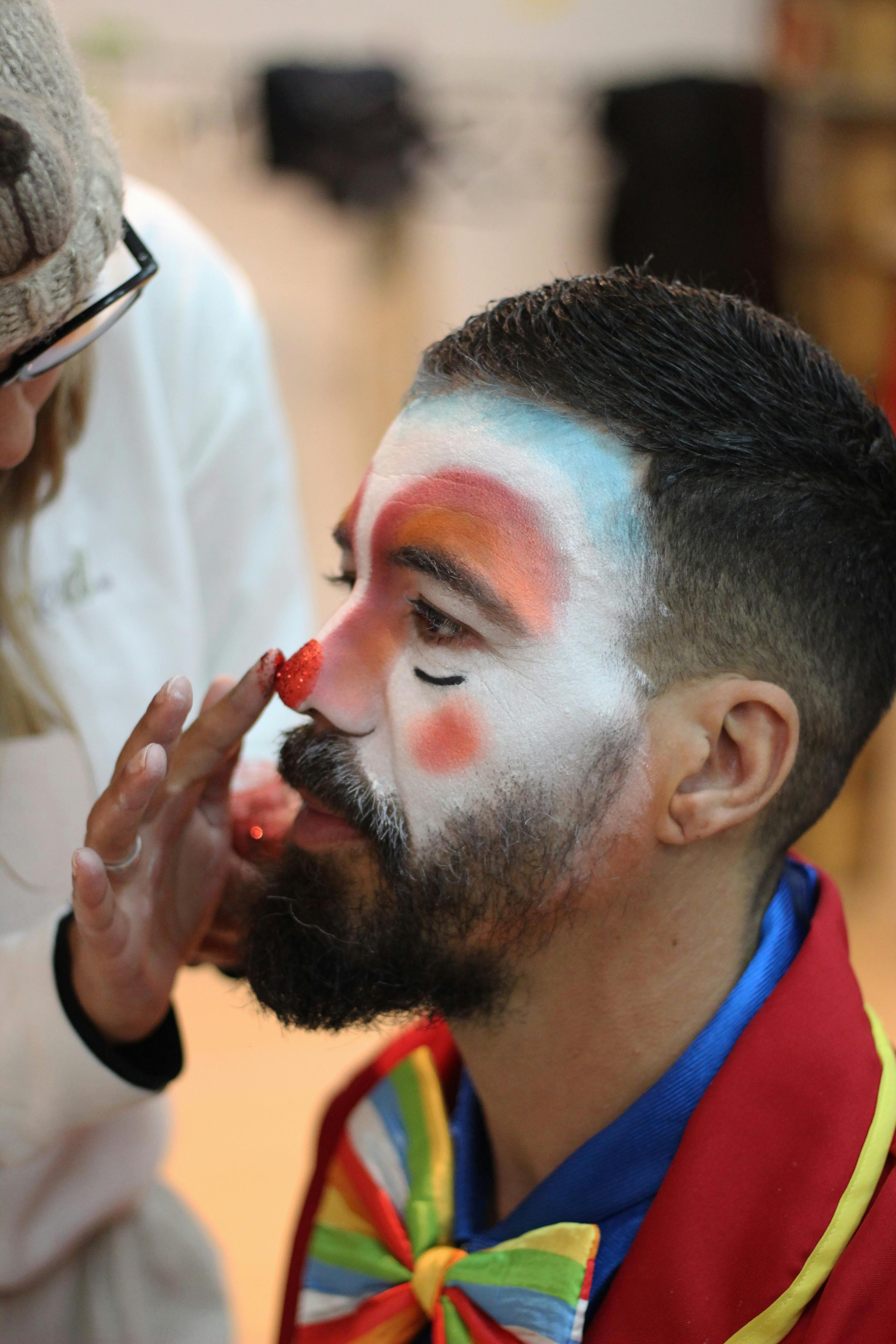 Clown Makeup Application During Event in Braga · Free Stock Photo