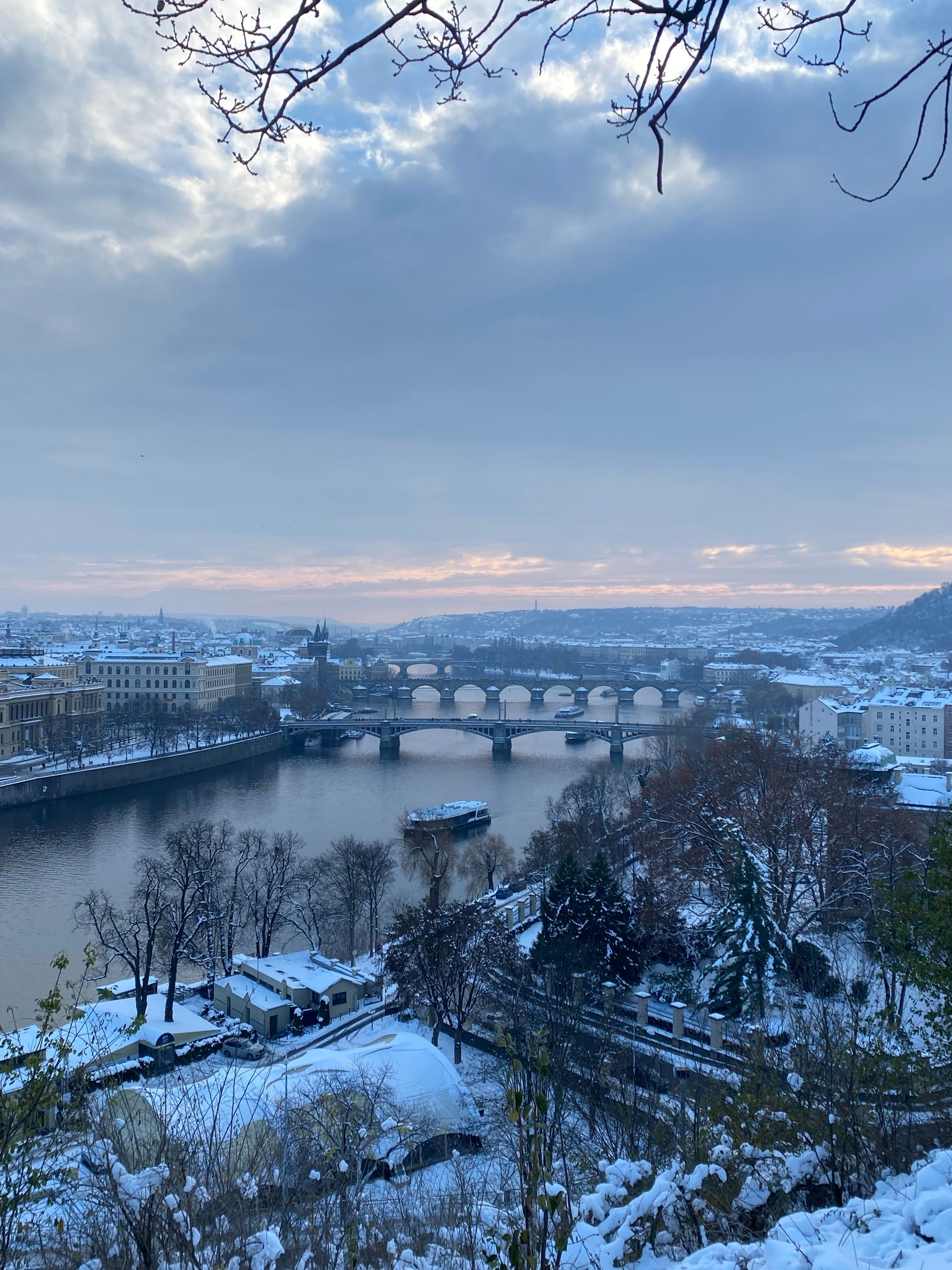Winter View of Snowy Prague with Charles Bridge · Free Stock Photo