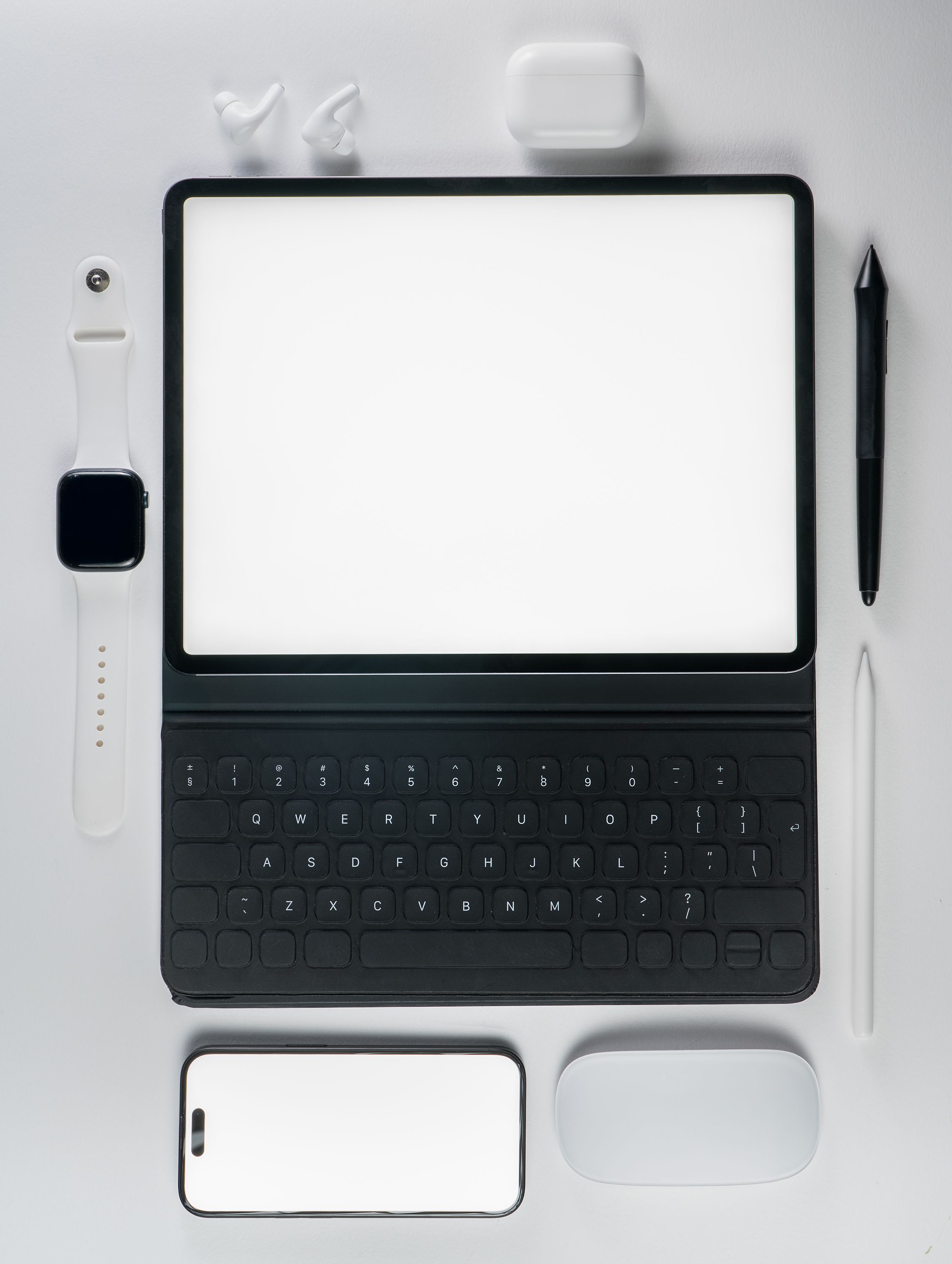 Minimalist Tech Gadget Flat Lay Arrangement · Free Stock Photo