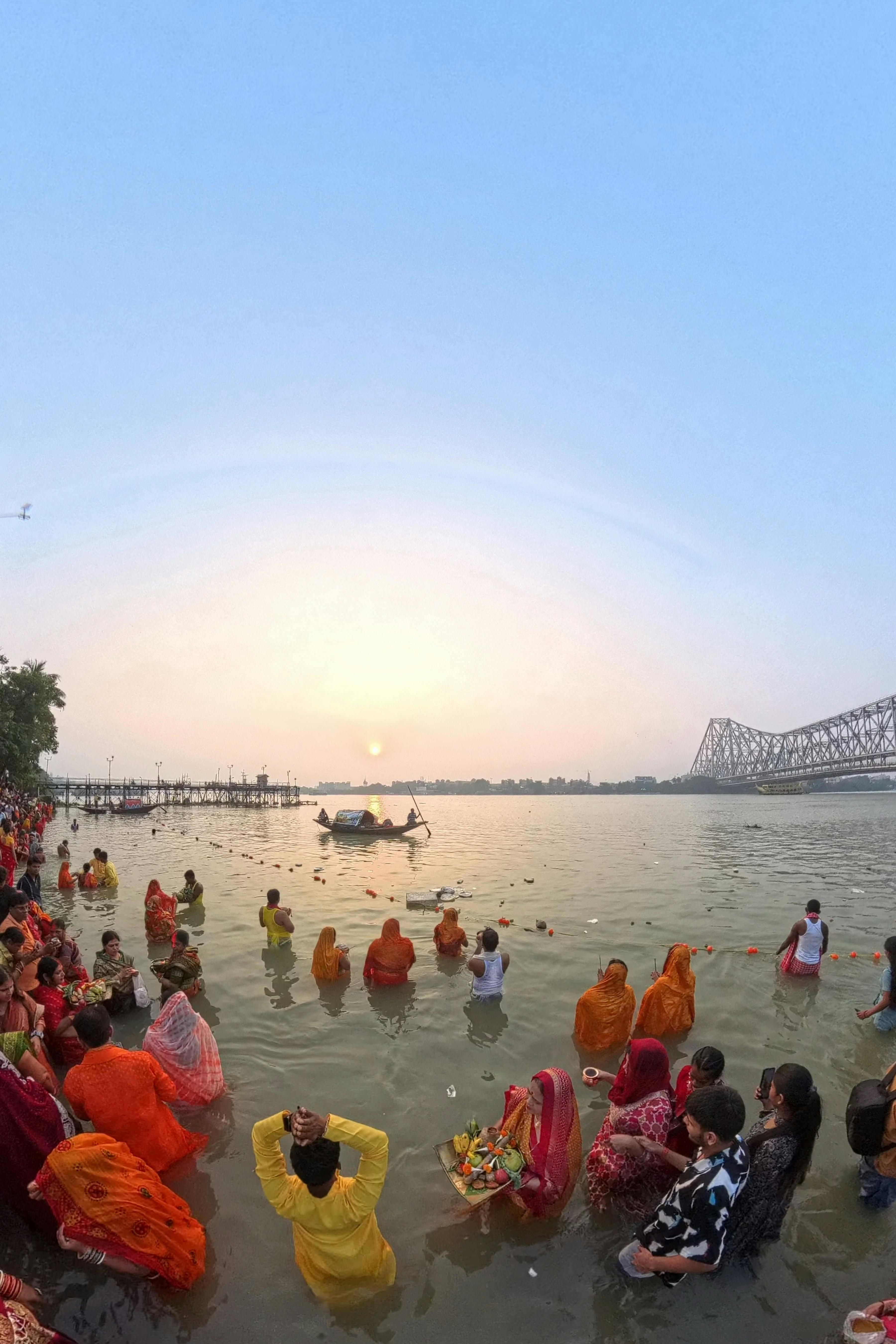 Devotees Participating in Chhath Puja at Sunset · Free Stock Photo