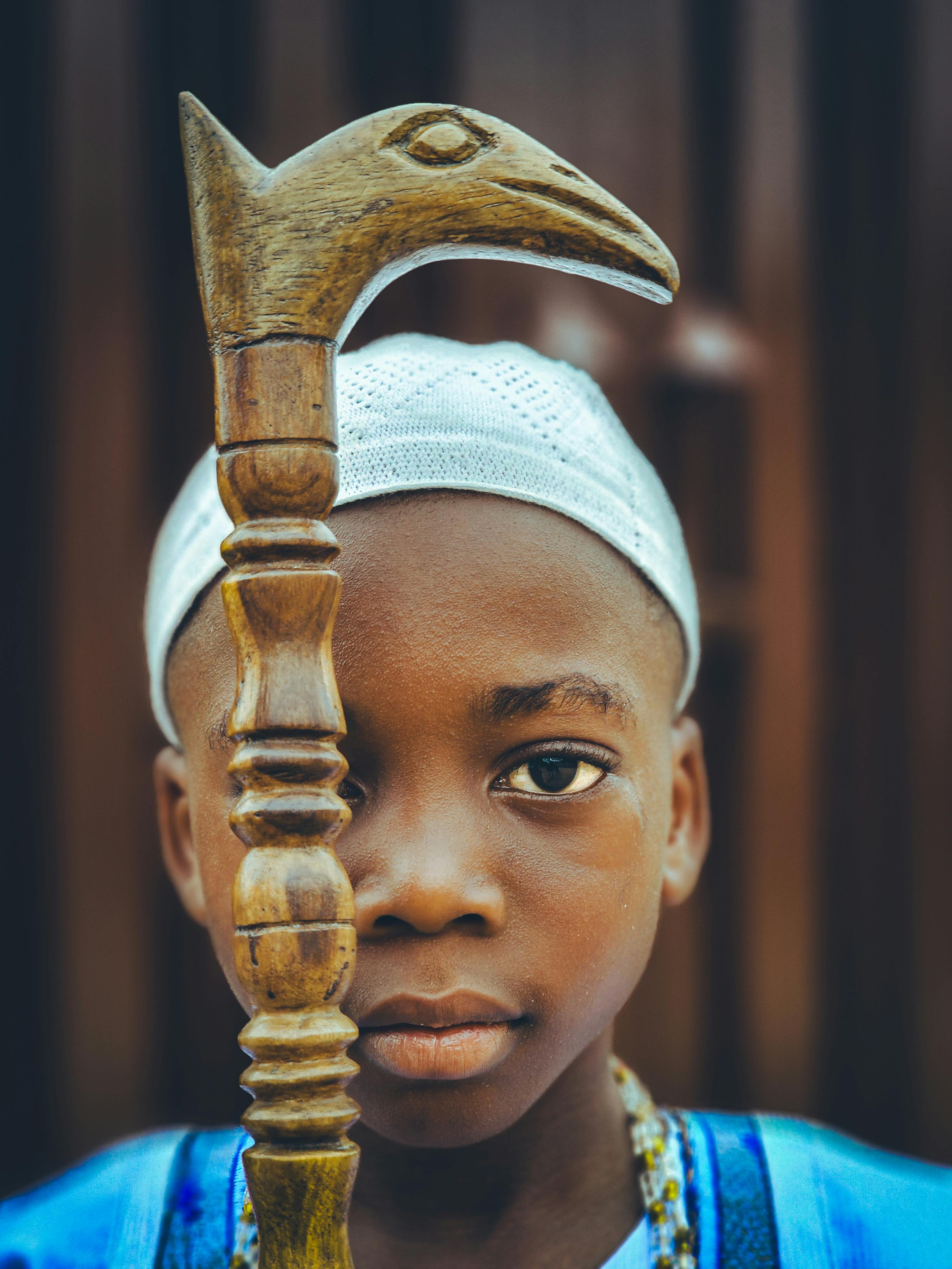 Portrait of Child with Ornate Wooden Cane · Free Stock Photo