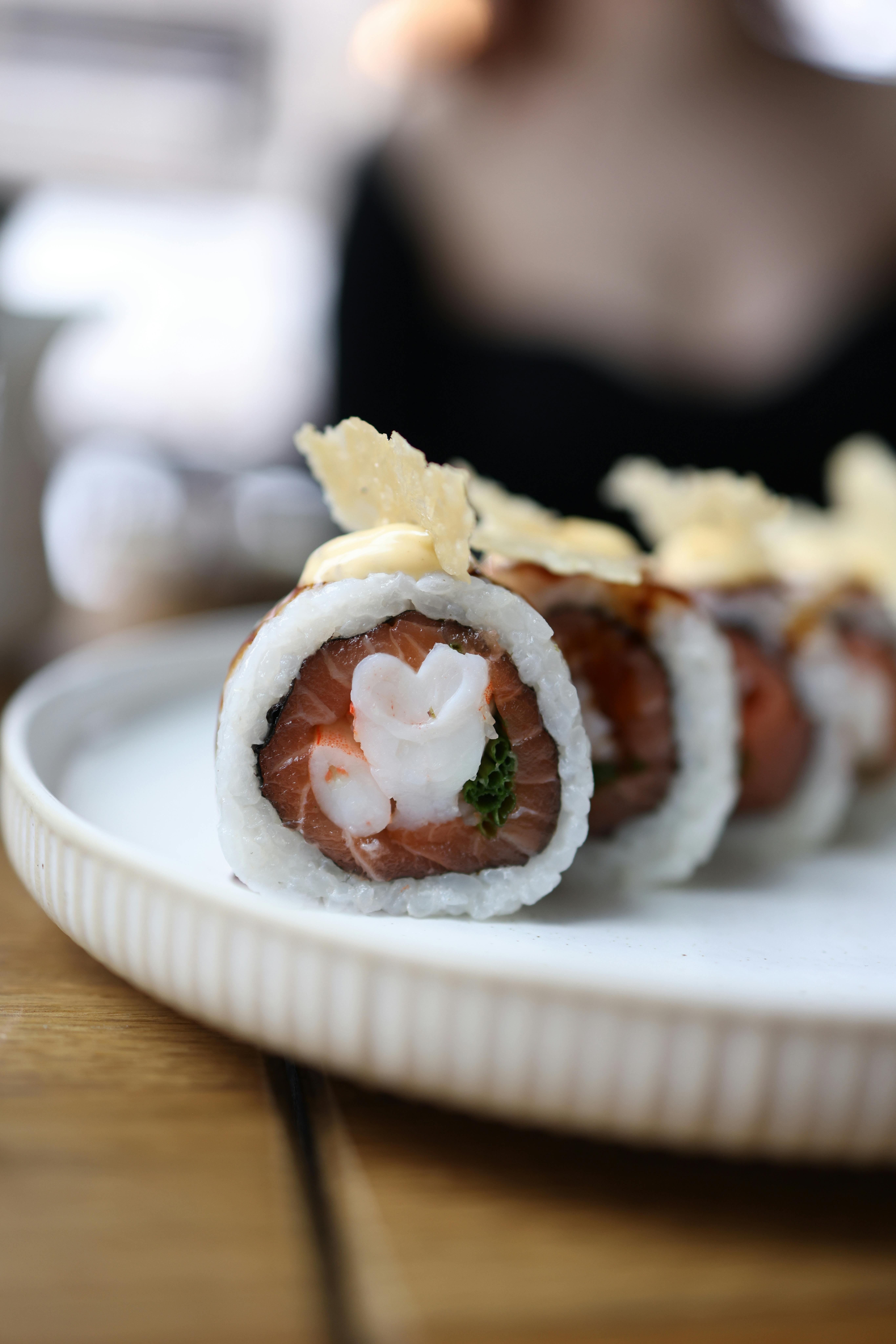 Delicious Sushi Roll Elegantly Plated · Free Stock Photo