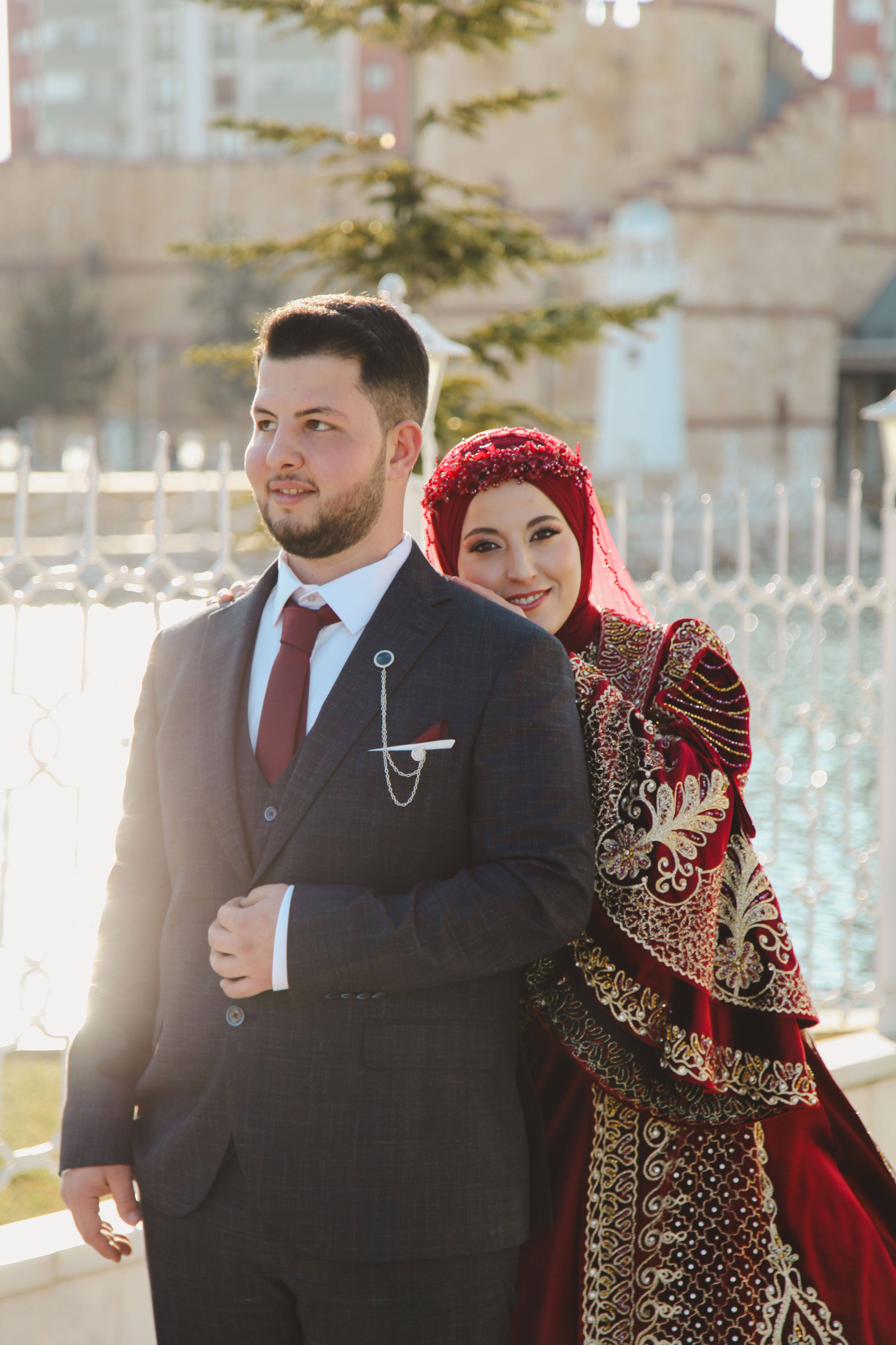 Cultural Wedding Couple in Traditional Attire · Free Stock Photo