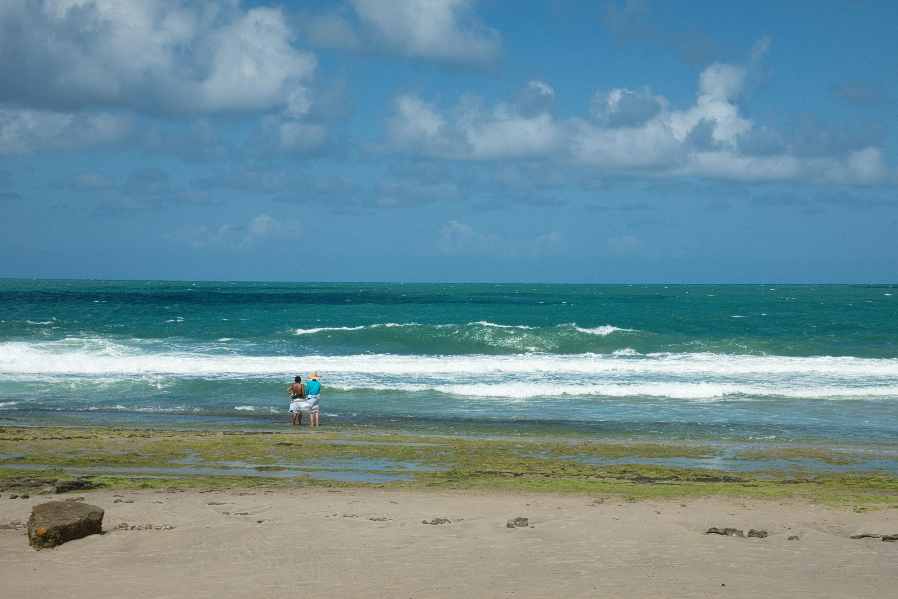 Couple Enjoying Barra do Cunhaú Beach Scenery · Free Stock Photo