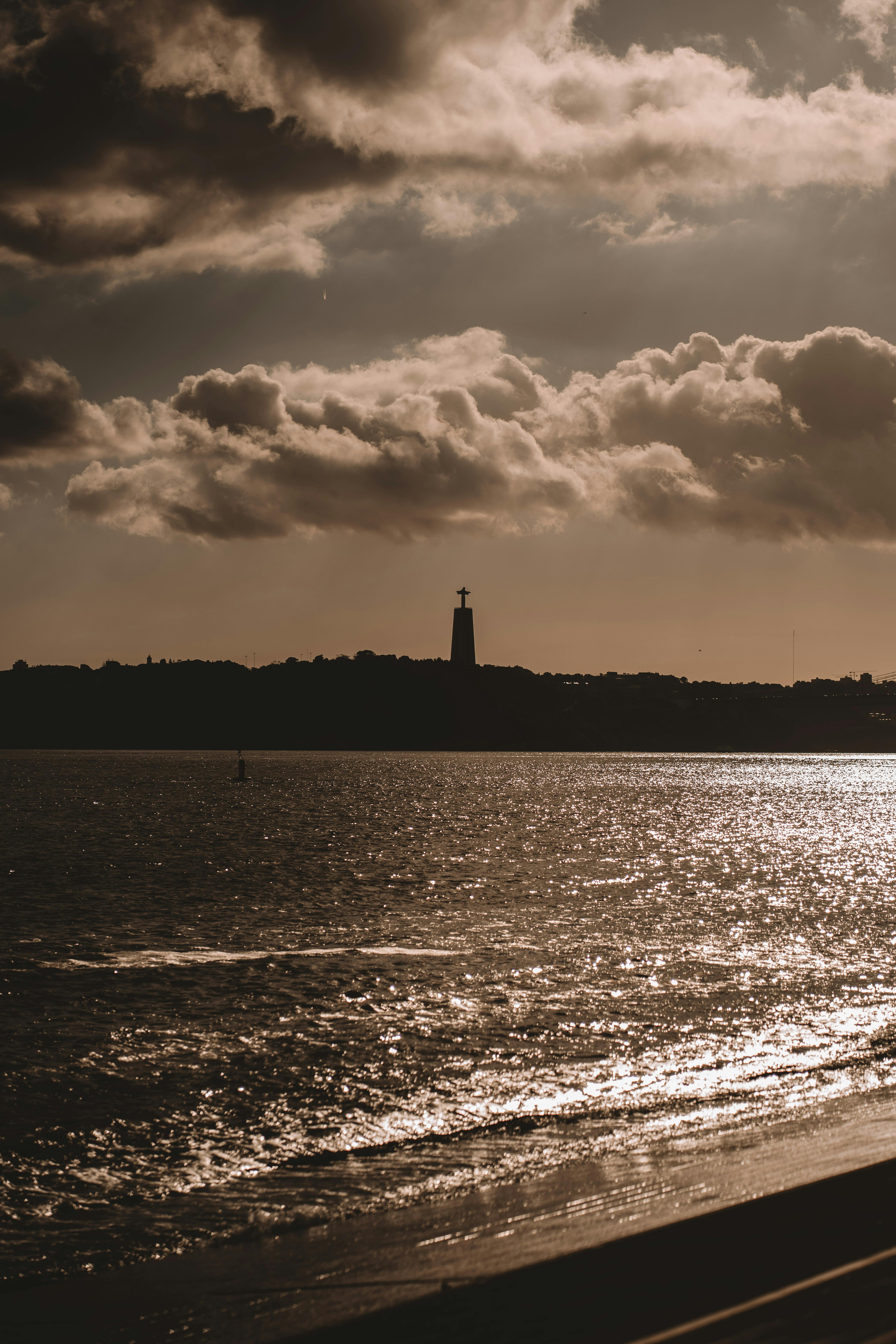 Dramatic Sunset Over Lisbon Coastline · Free Stock Photo