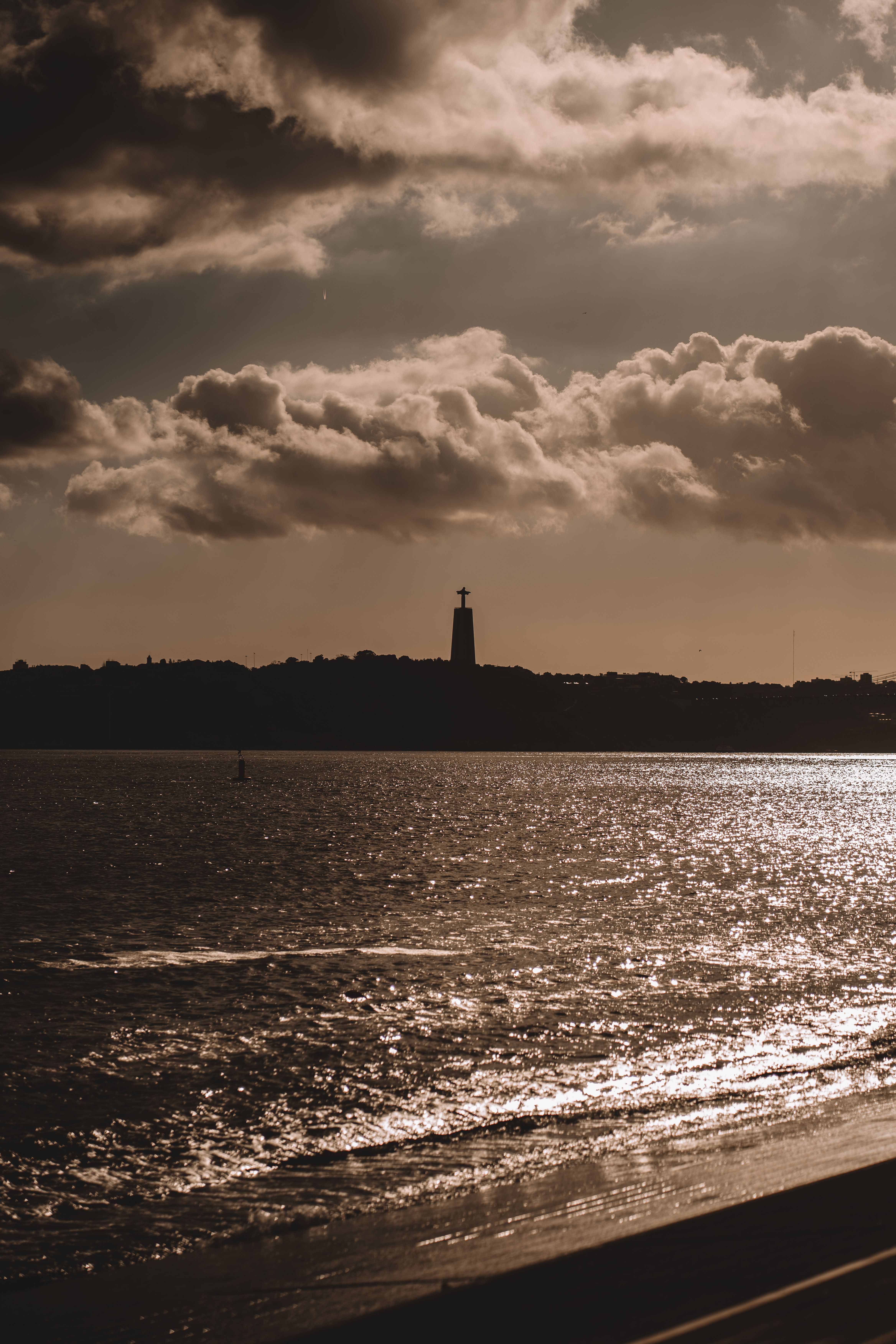 Dramatic Sunset Over Lisbon Coastline · Free Stock Photo