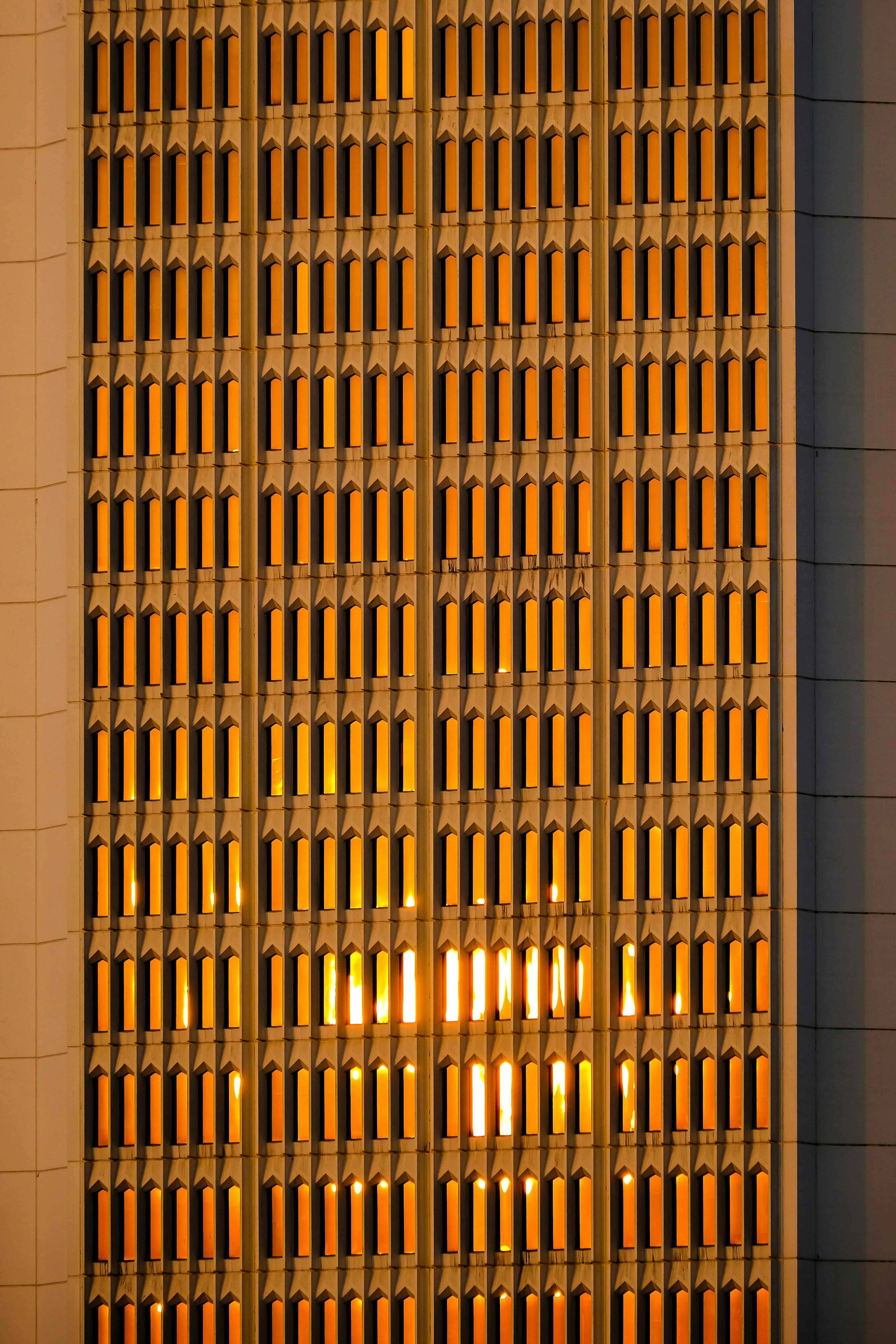 Sunset Reflection on Urban High-Rise Windows · Free Stock Photo