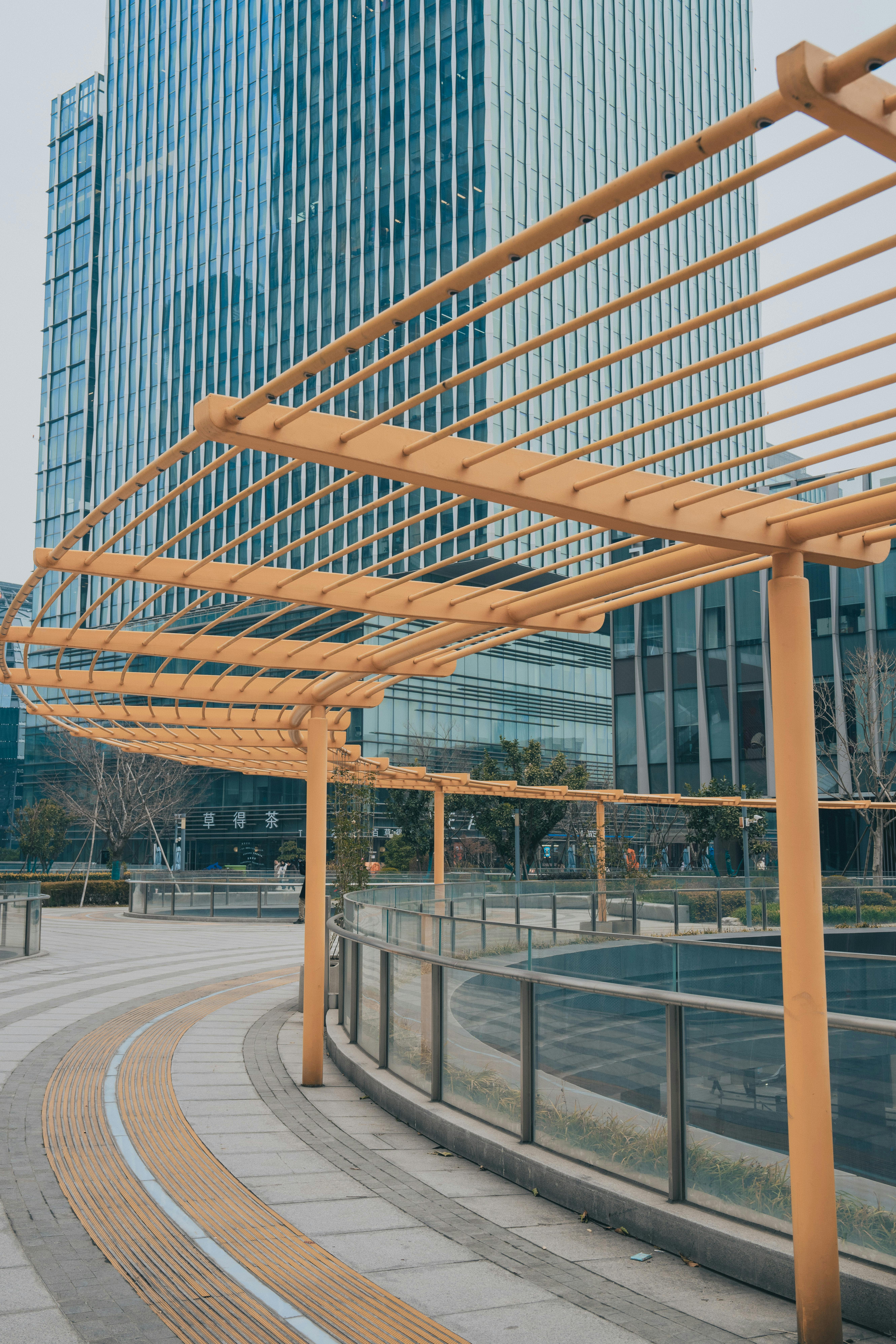 Modern Urban Architecture with Yellow Canopy · Free Stock Photo