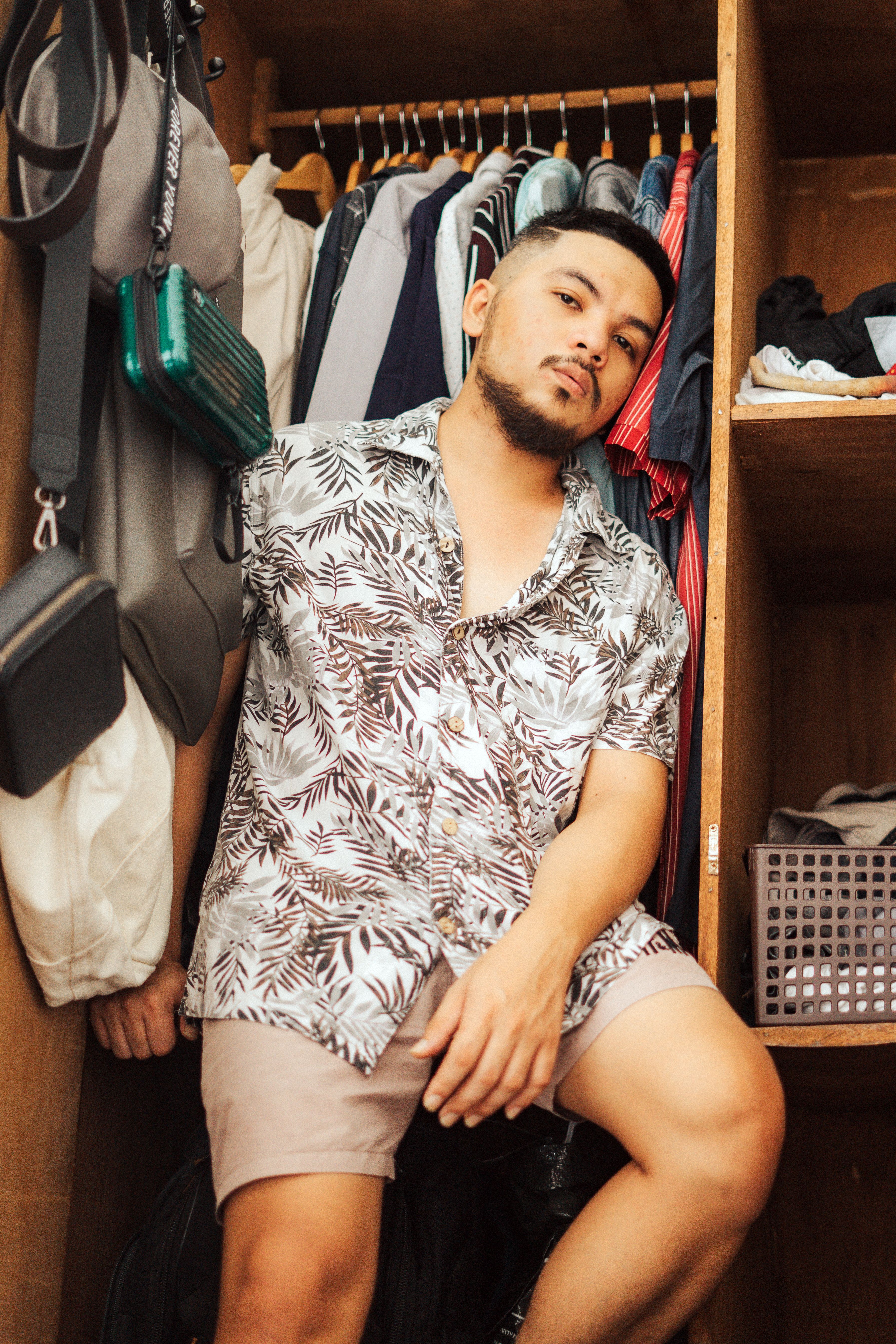 Casual Fashionable Man in Organized Closet · Free Stock Photo