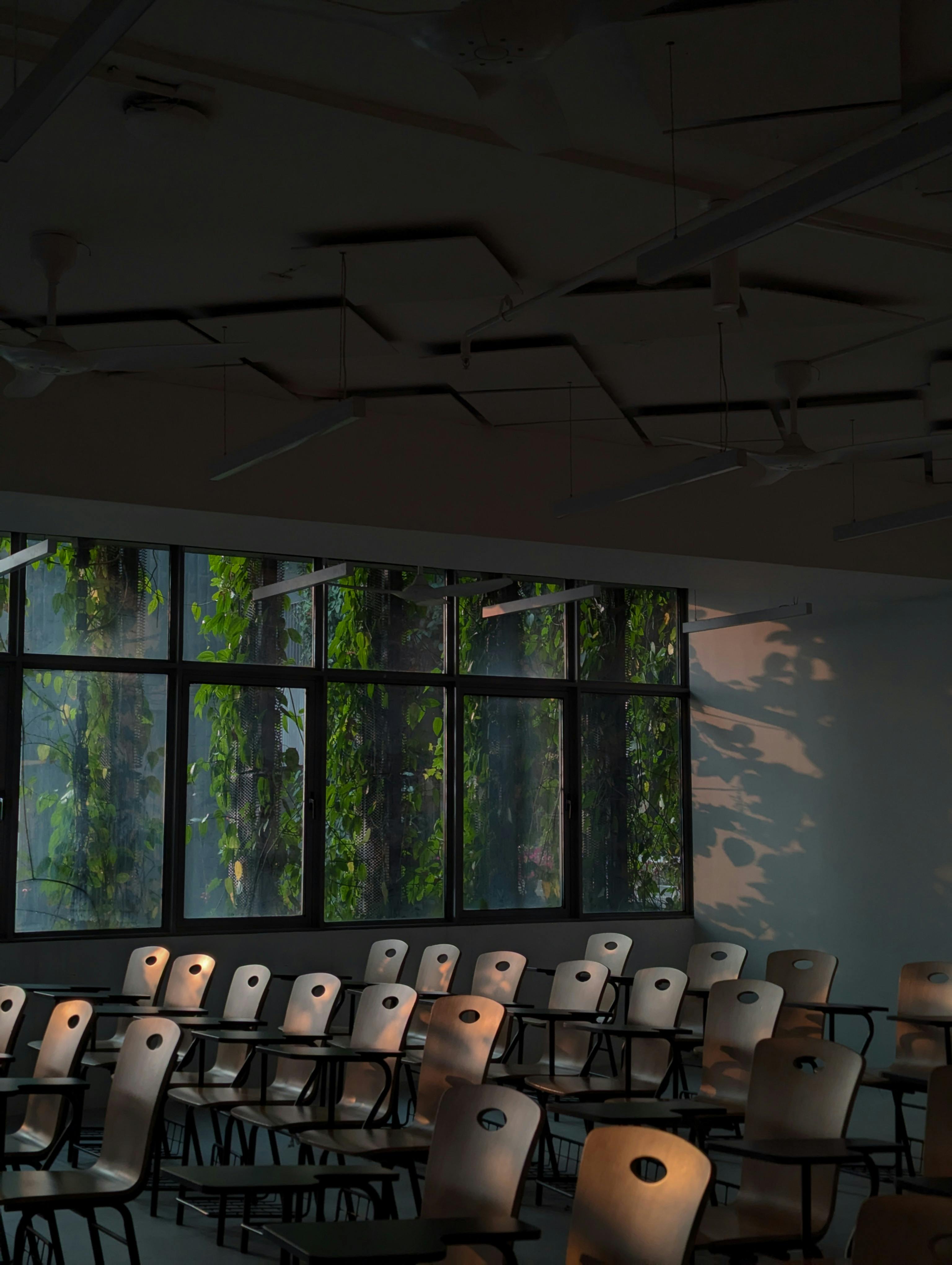Empty Classroom with Natural Light and Shadows · Free Stock Photo