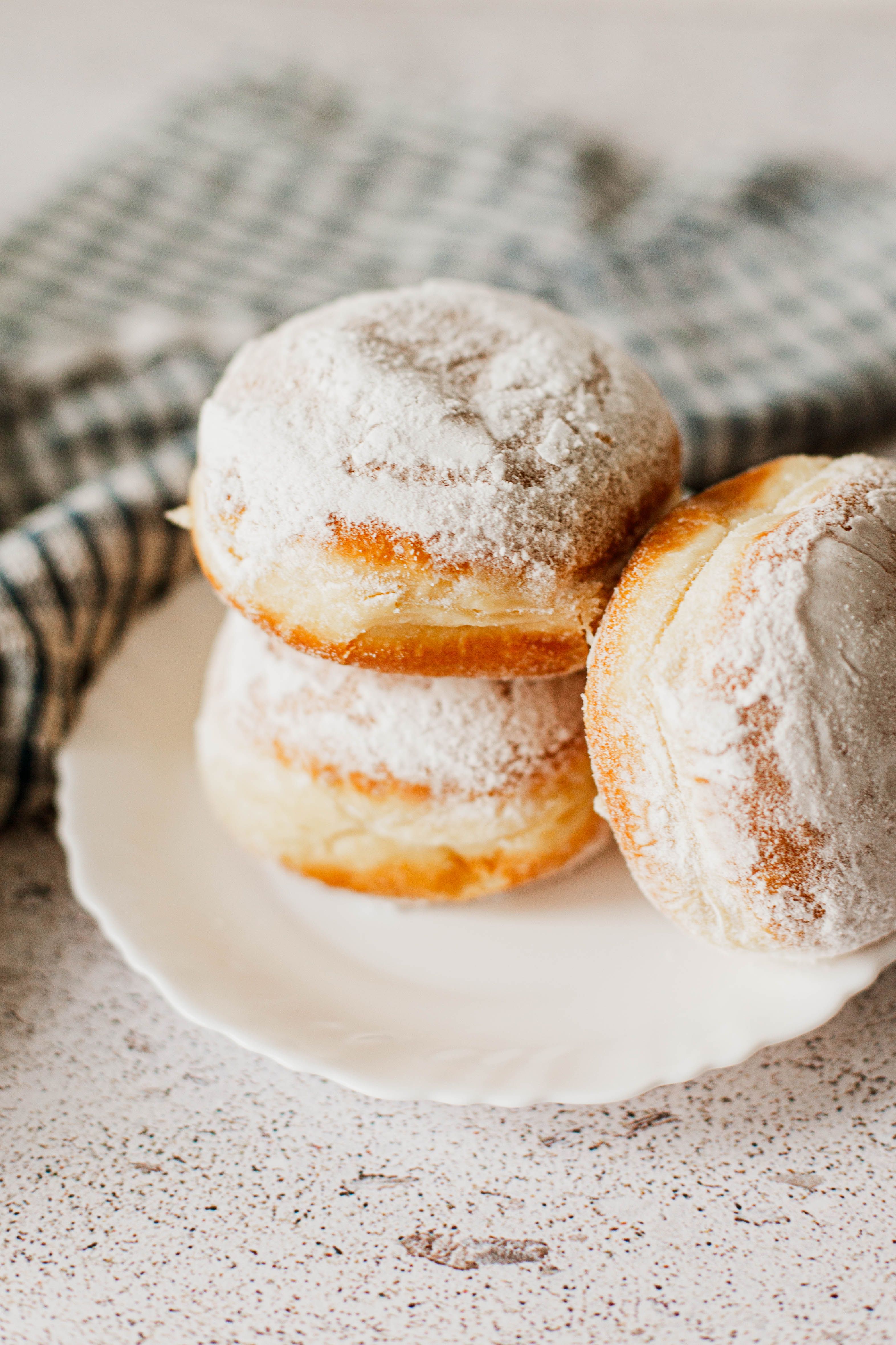 Delicious Stack of Powdered Sugar Donuts · Free Stock Photo