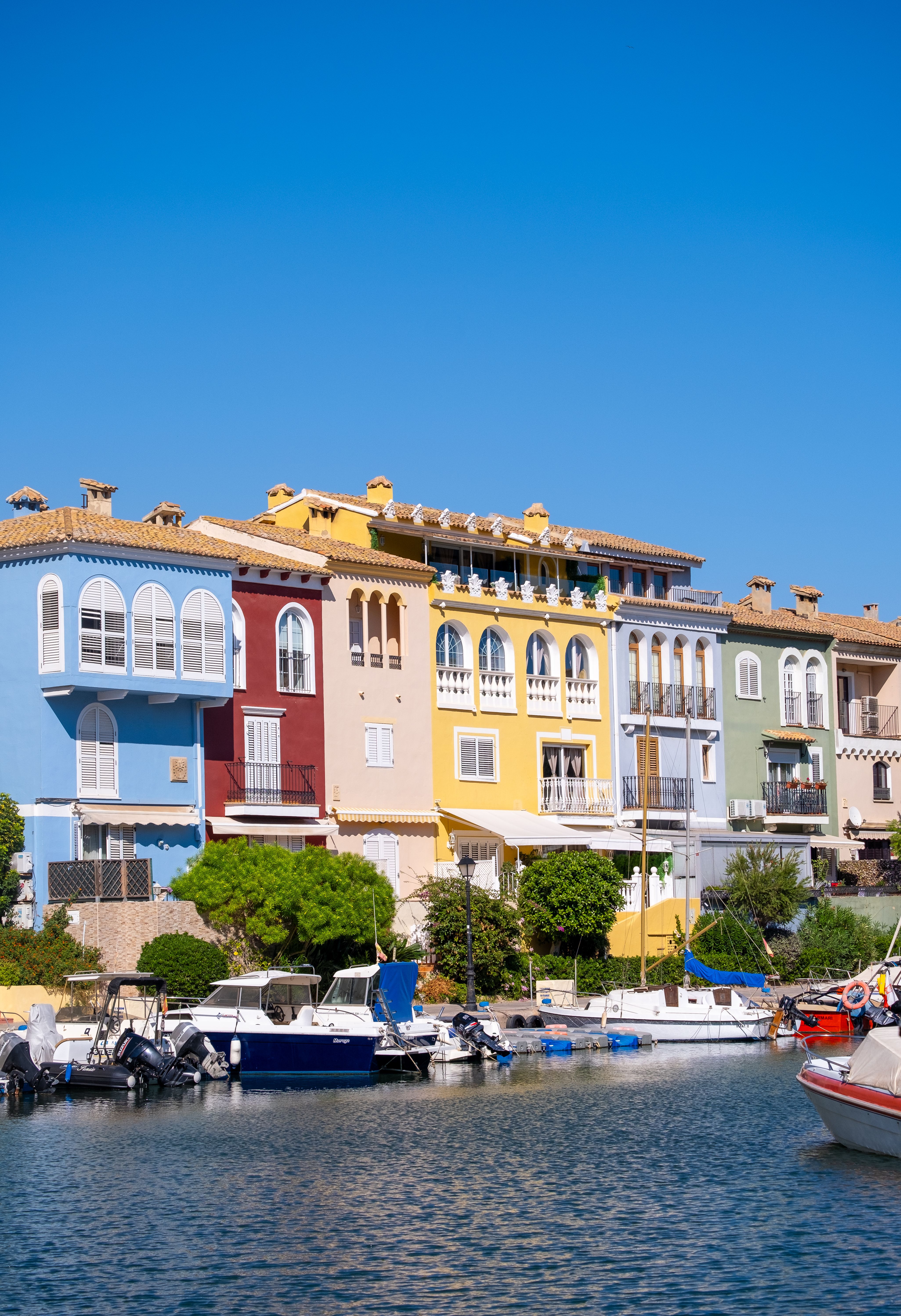 Colorful Waterfront Homes in Scenic Coastal Town · Free Stock Photo