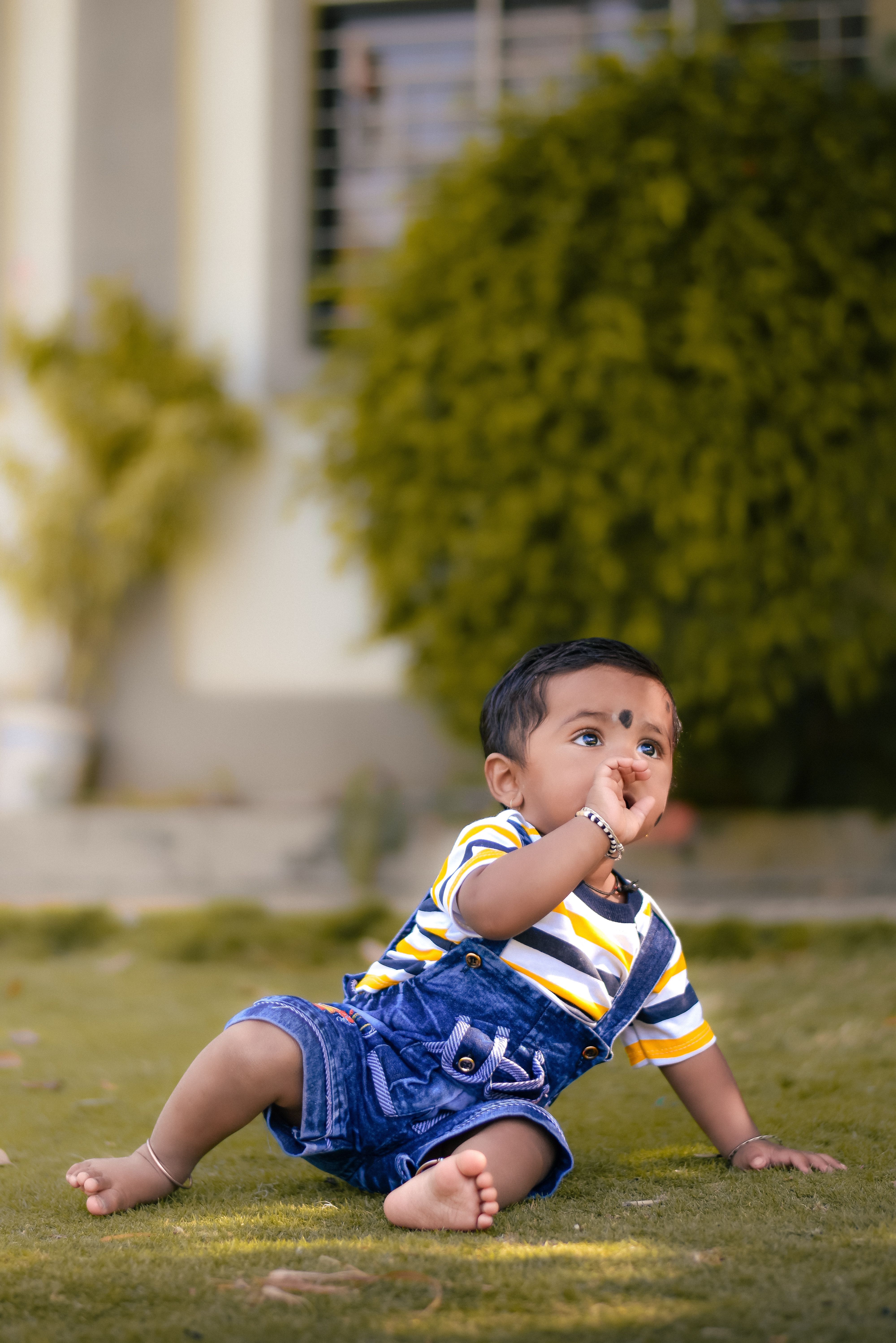 Adorable Baby Playing Outdoors on Grass · Free Stock Photo