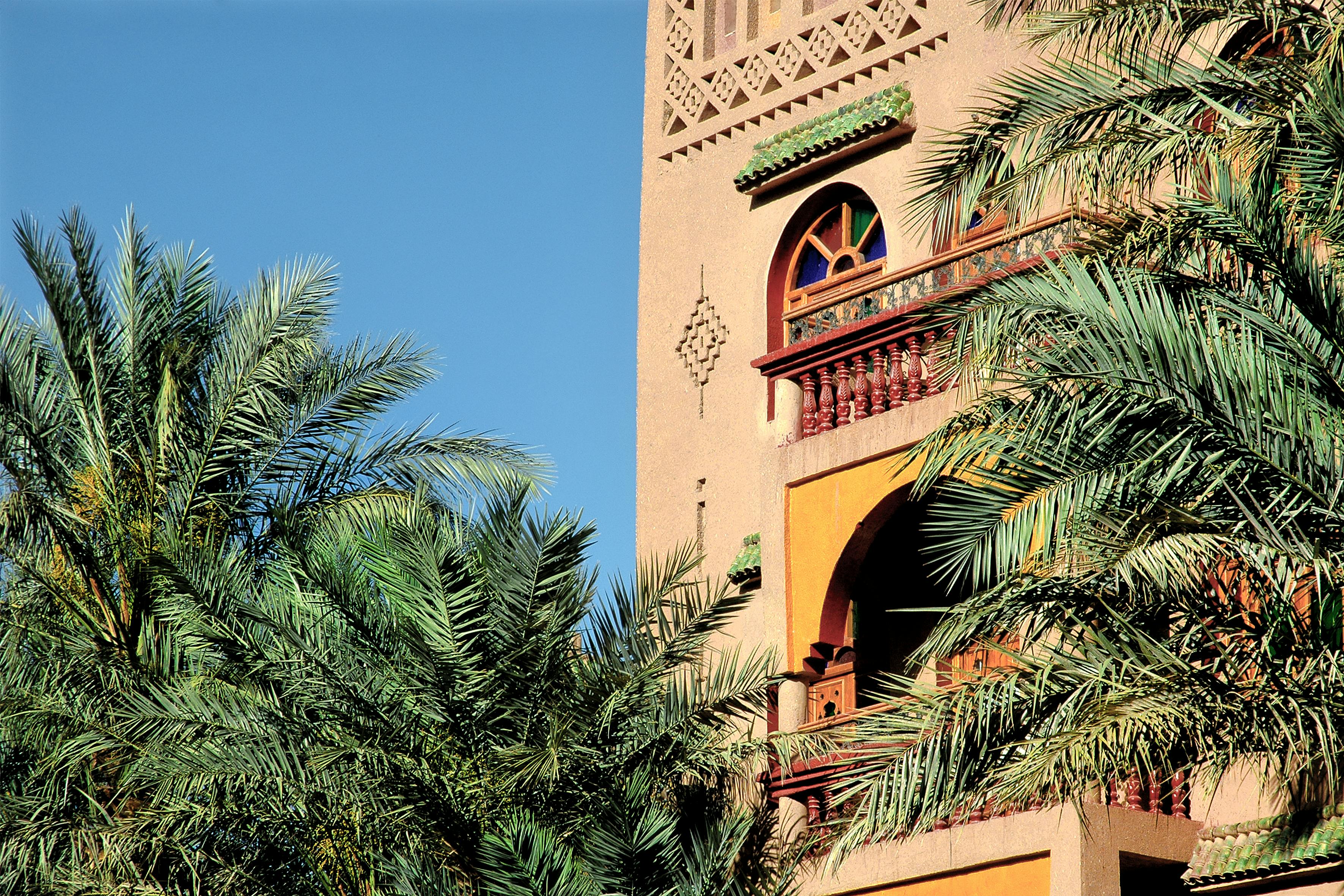 Traditional Moroccan Architecture Amidst Palm Trees · Free Stock Photo
