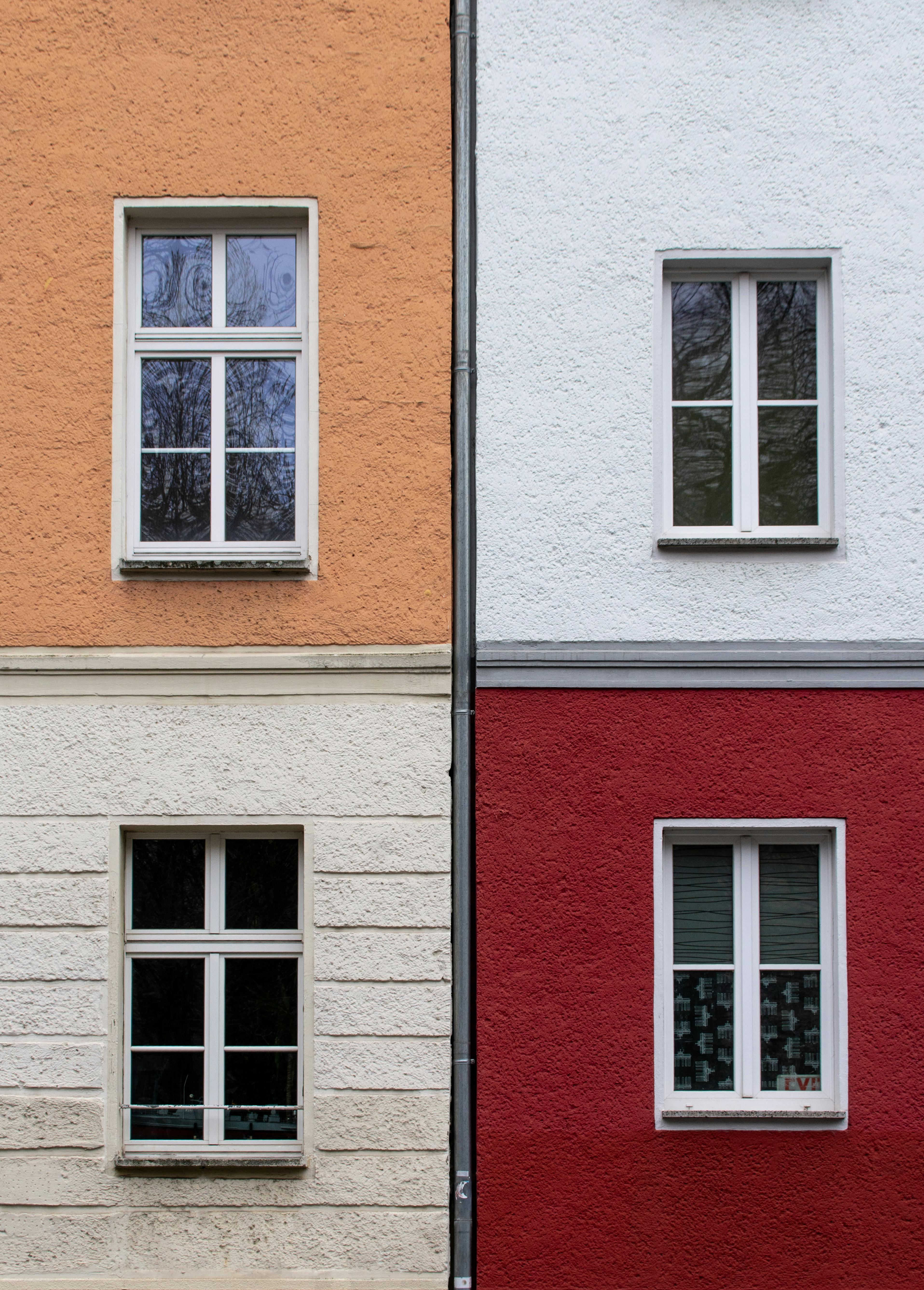 Colorful Divided Building Facade with Windows · Free Stock Photo