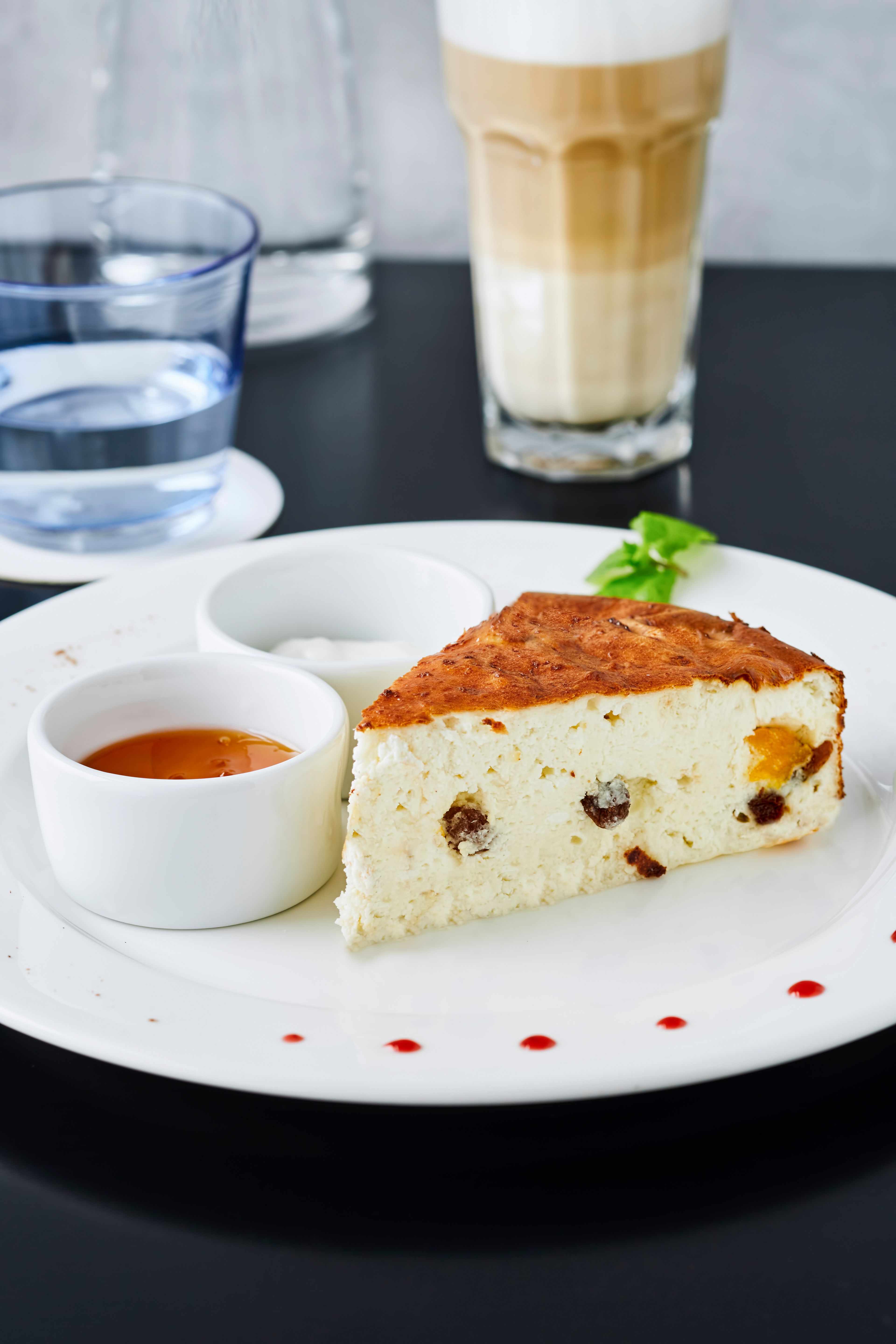 Delicious Cheesecake with Coffee in Café Setting · Free Stock Photo
