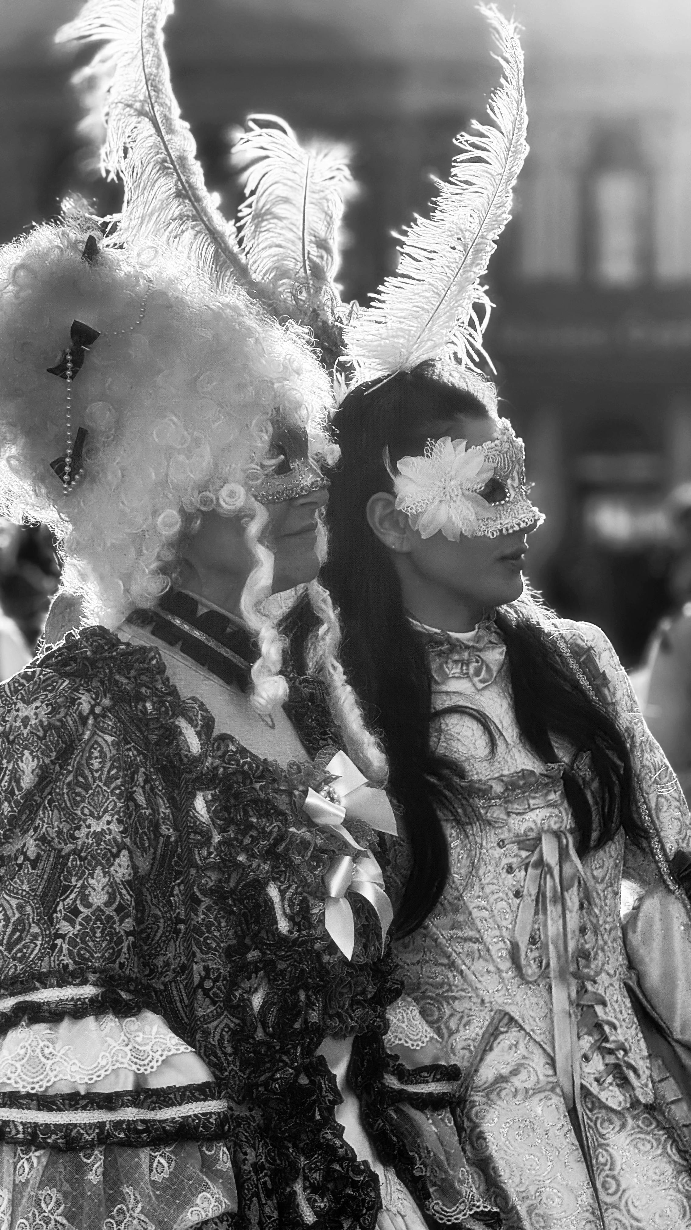 Elegant Venetian Masked Ball Costumes in Black and White · Free Stock Photo