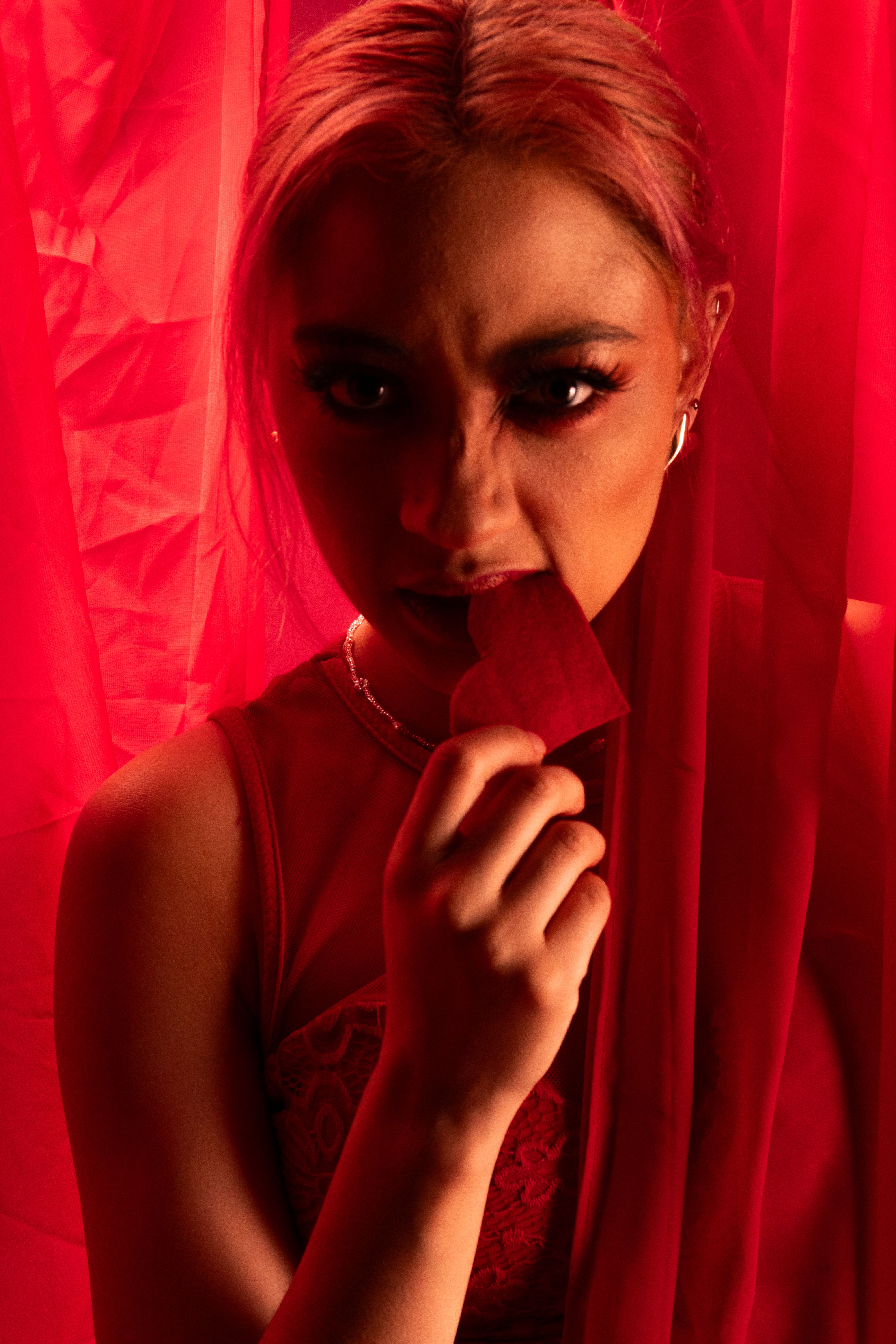 Dramatic Portrait of Woman in Red Lighting · Free Stock Photo