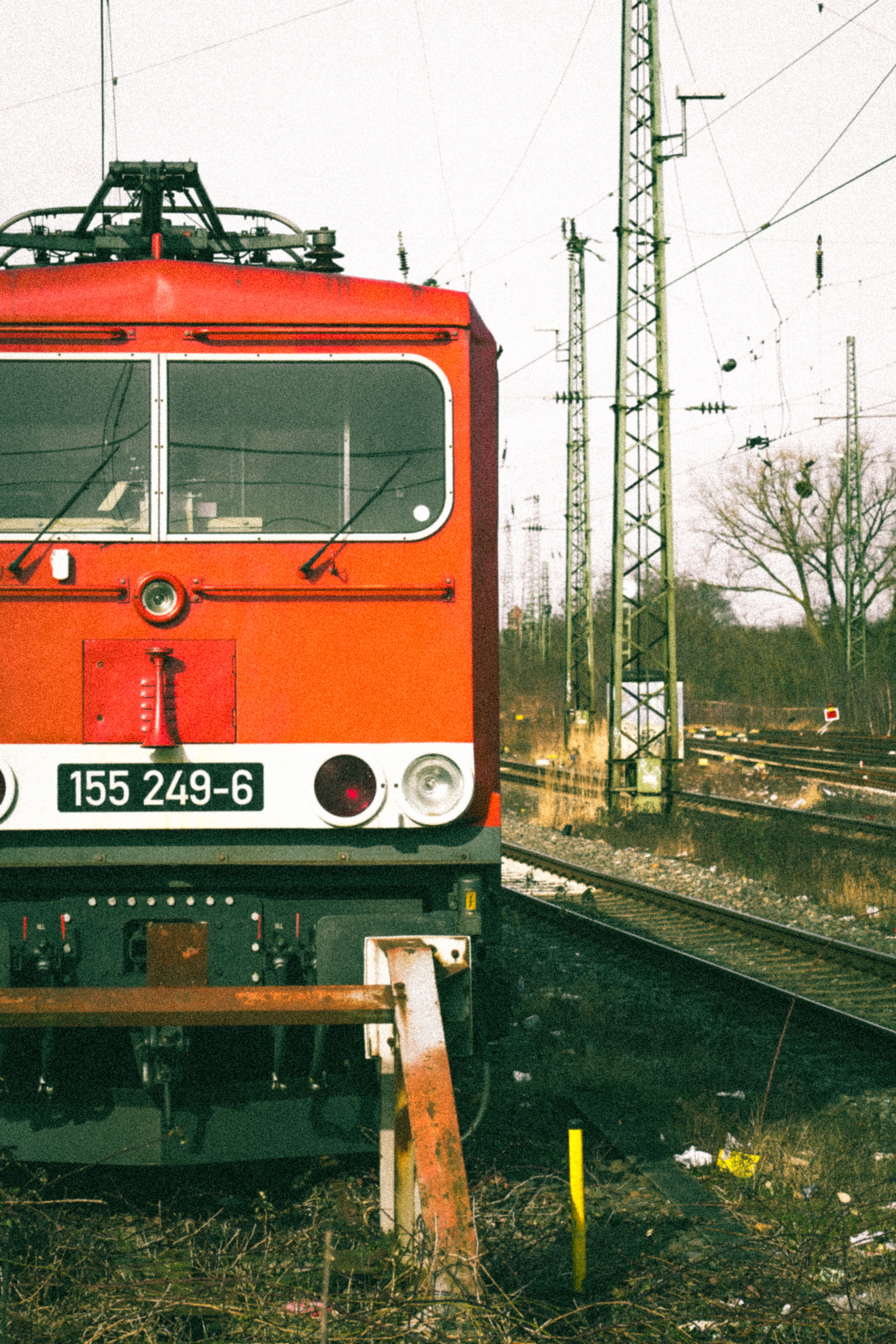 Front View of Red Train on Railway Tracks · Free Stock Photo