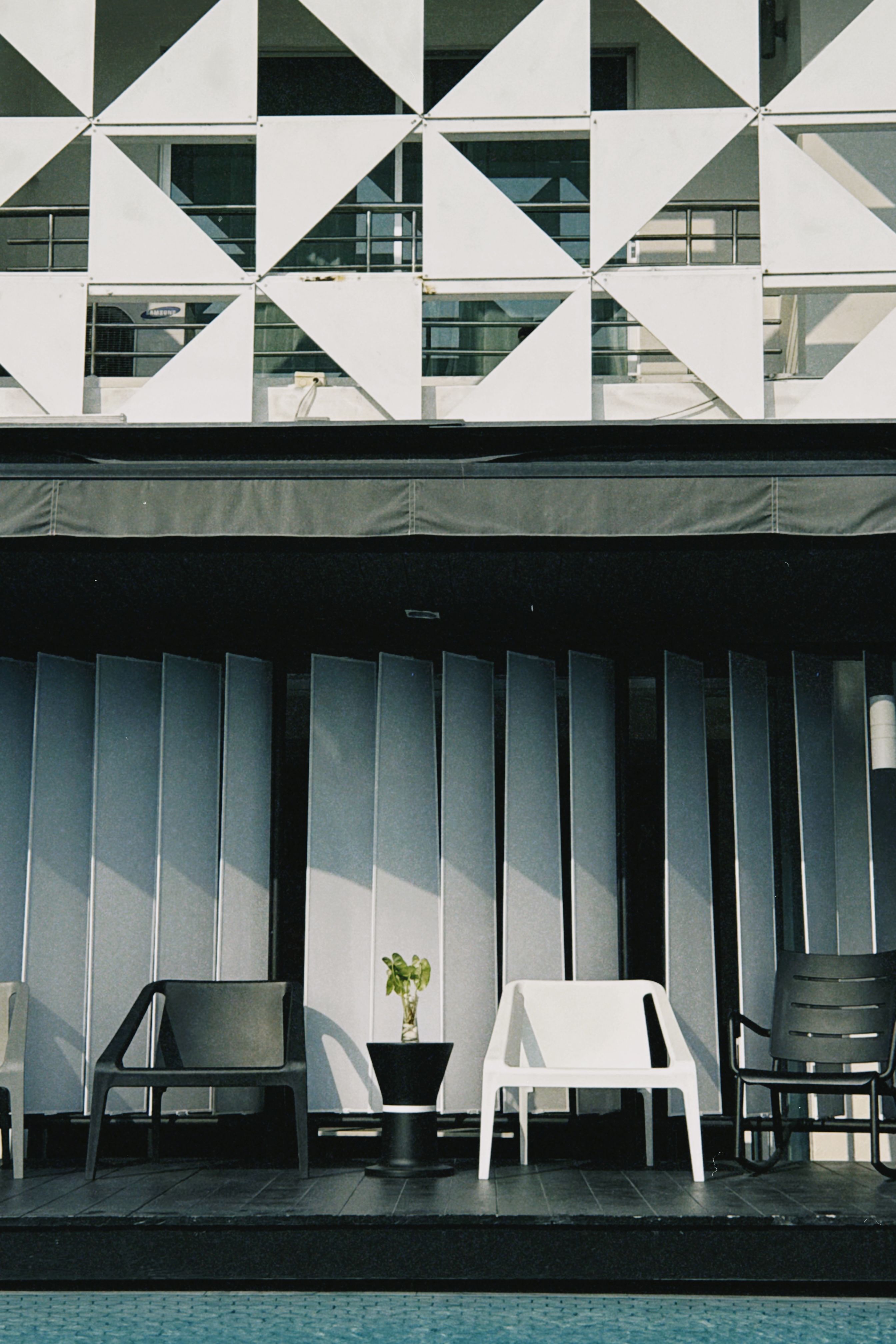 Modern Patio Chairs by Geometric Building · Free Stock Photo