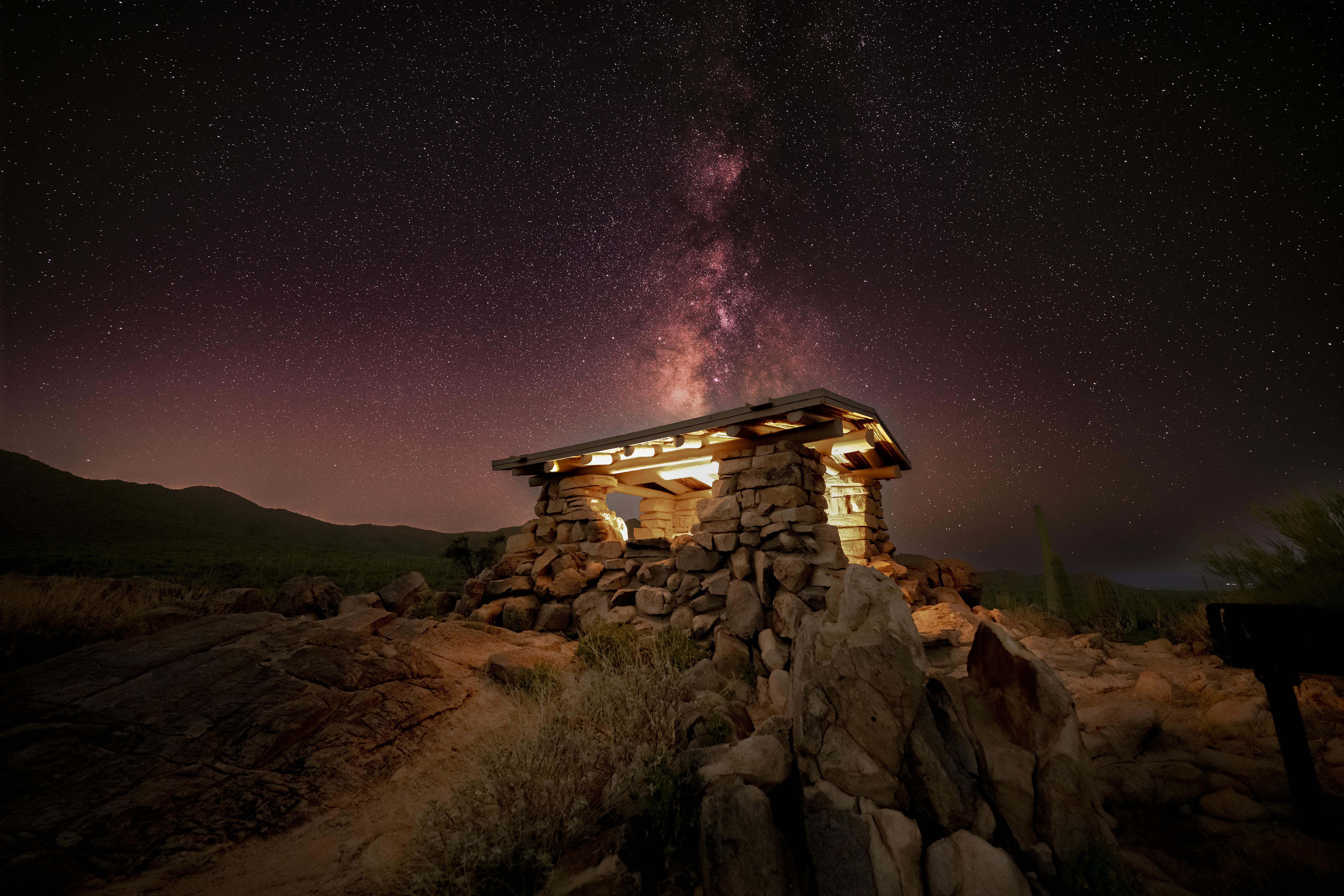 Stargazing at Stone Cabin under Milky Way in Arizona · Free Stock Photo