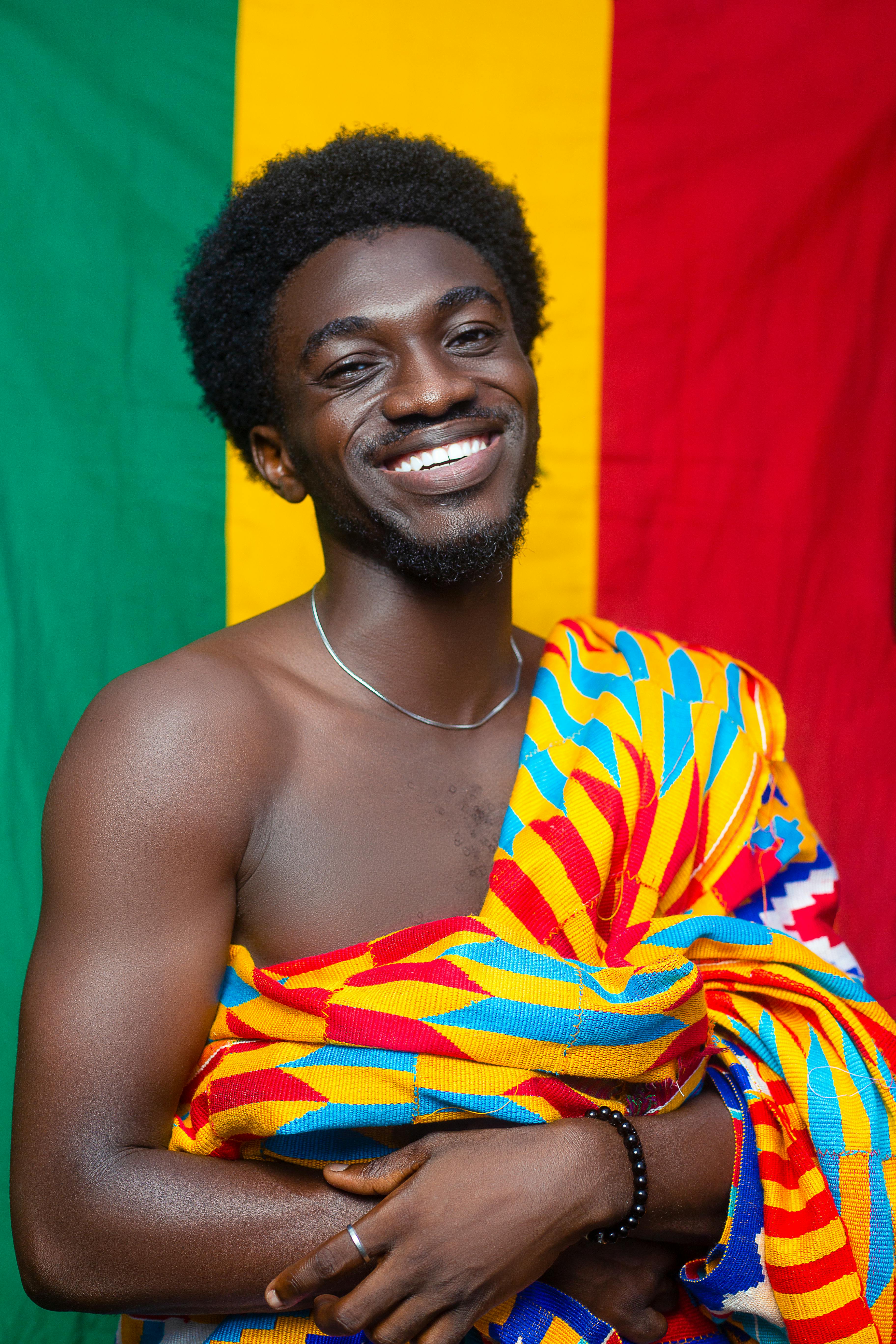 Portrait of a Man in Traditional Ghanaian Kente Cloth · Free Stock Photo