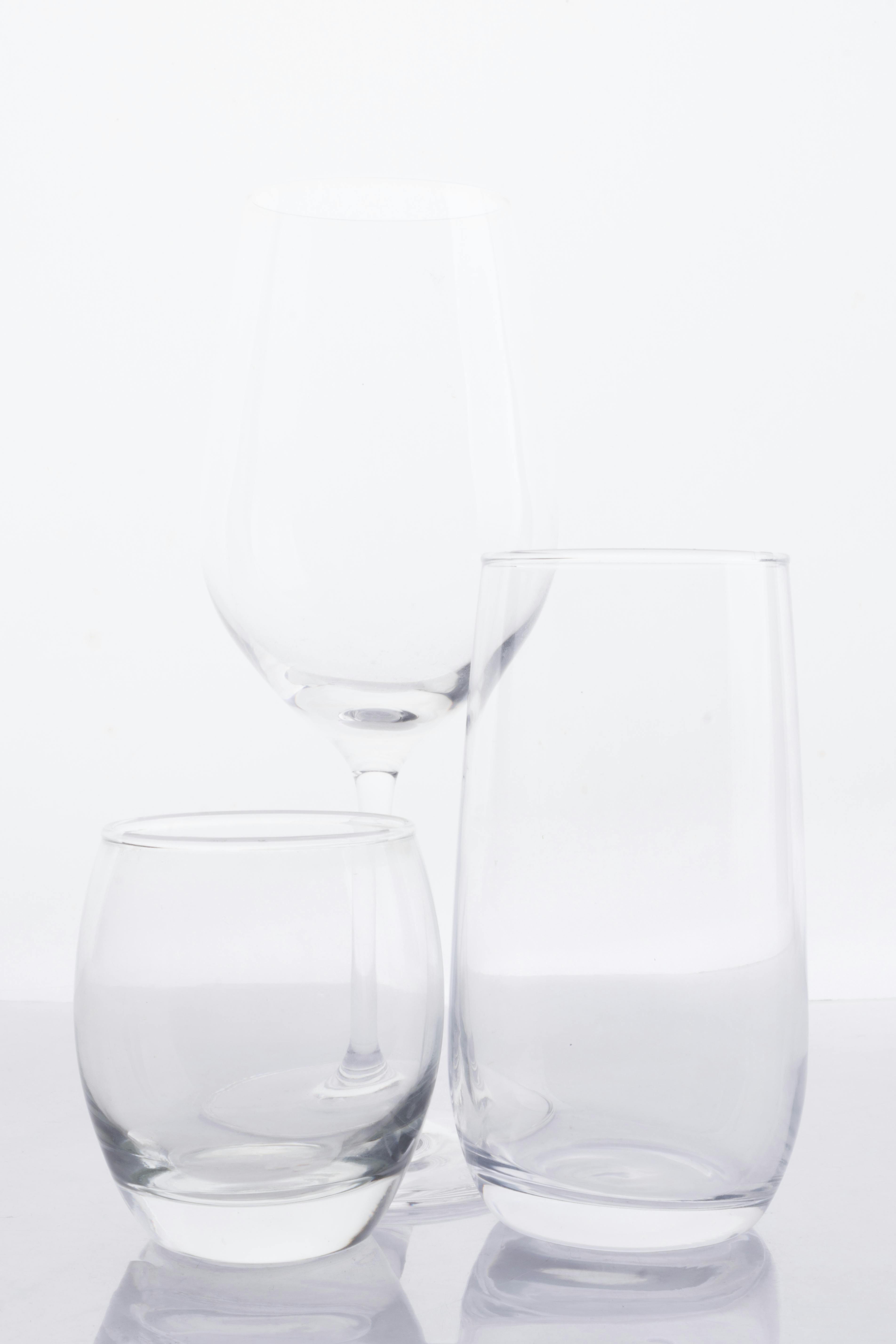 Minimalist Glassware Display on White Background · Free Stock Photo