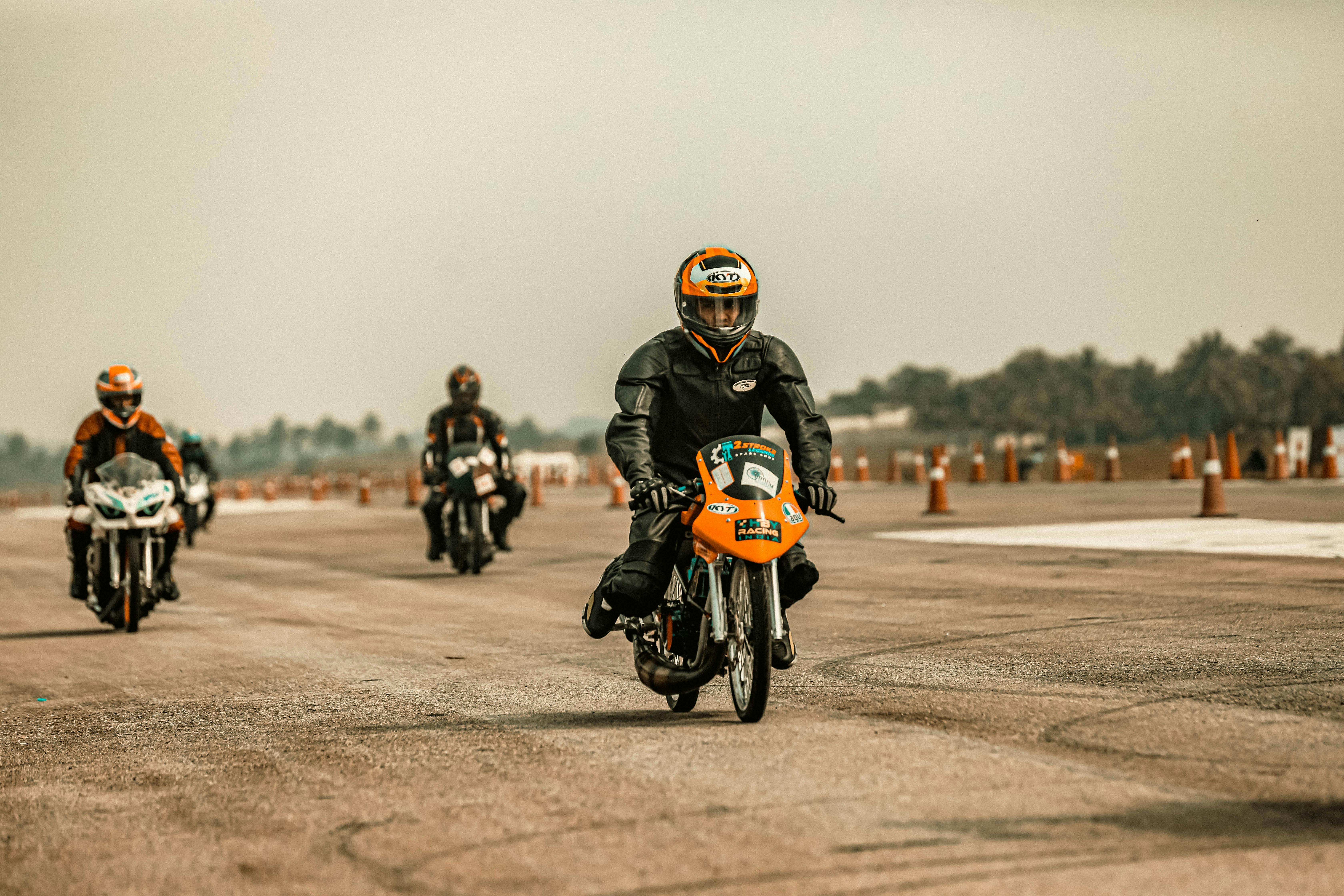 Person Riding Super Bike during Night Race · Free Stock Photo