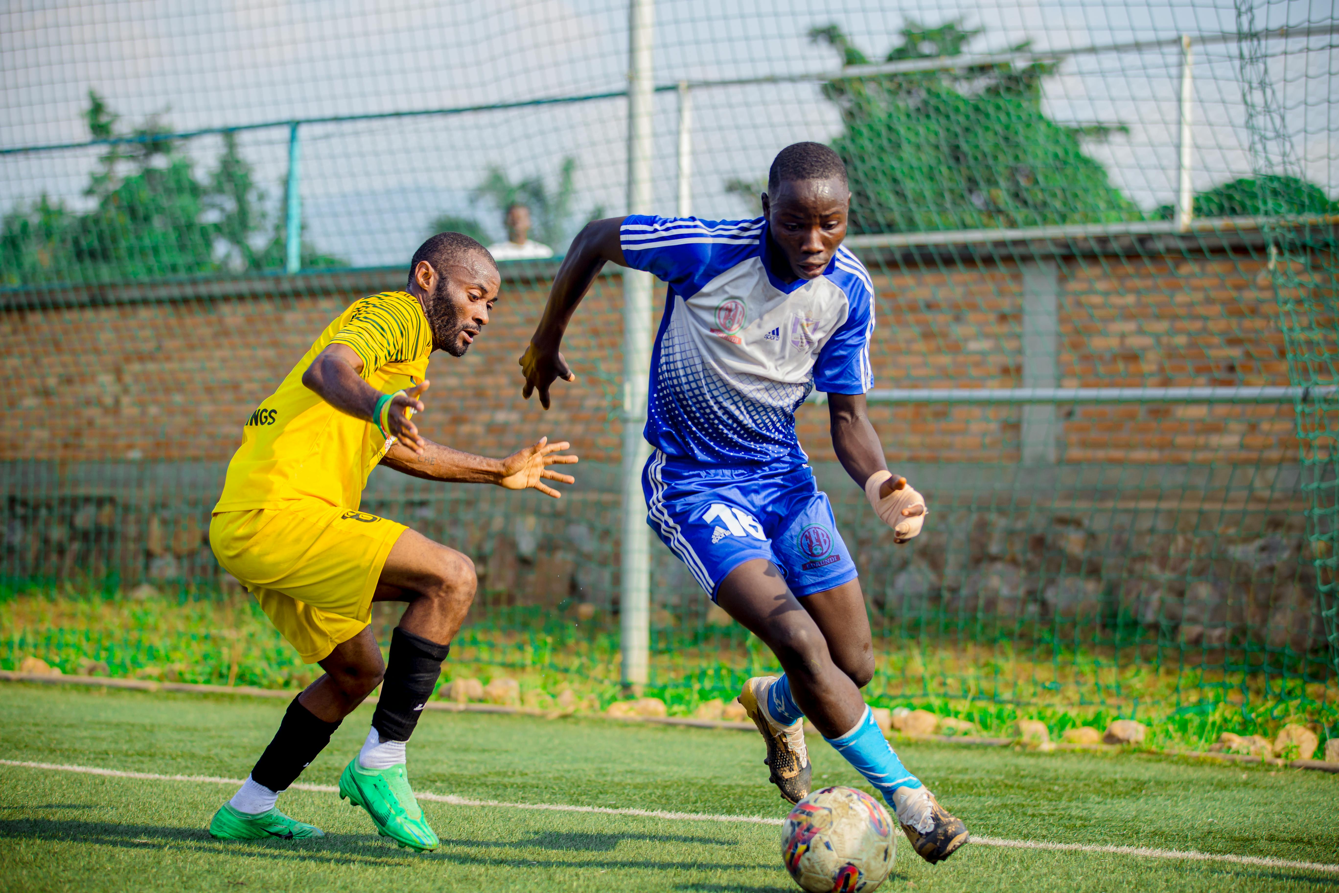 Intense Soccer Match on Outdoor Field · Free Stock Photo