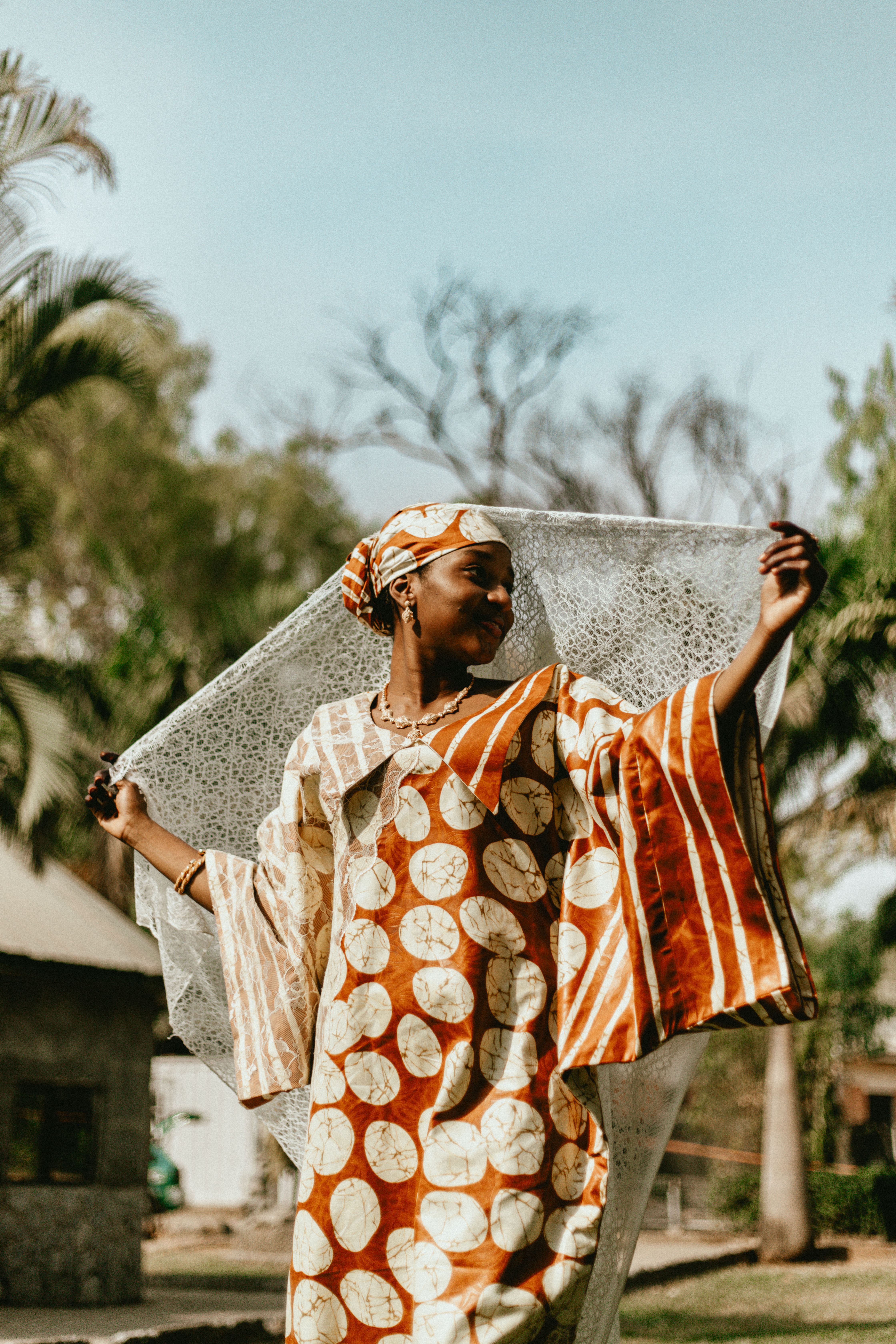 Traditional African Dress in Natural Setting · Free Stock Photo