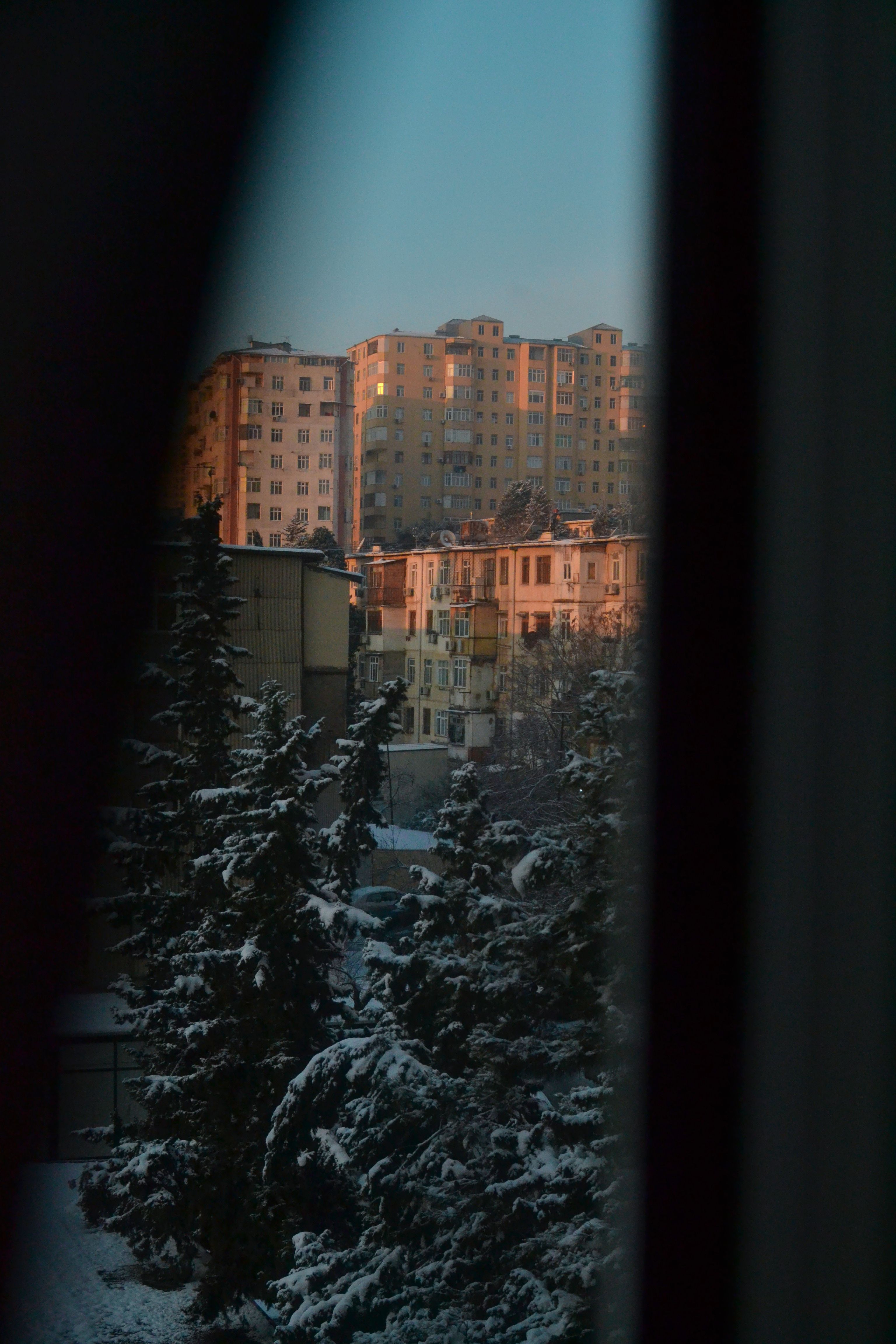 Snowy Urban Landscape at Sunrise · Free Stock Photo