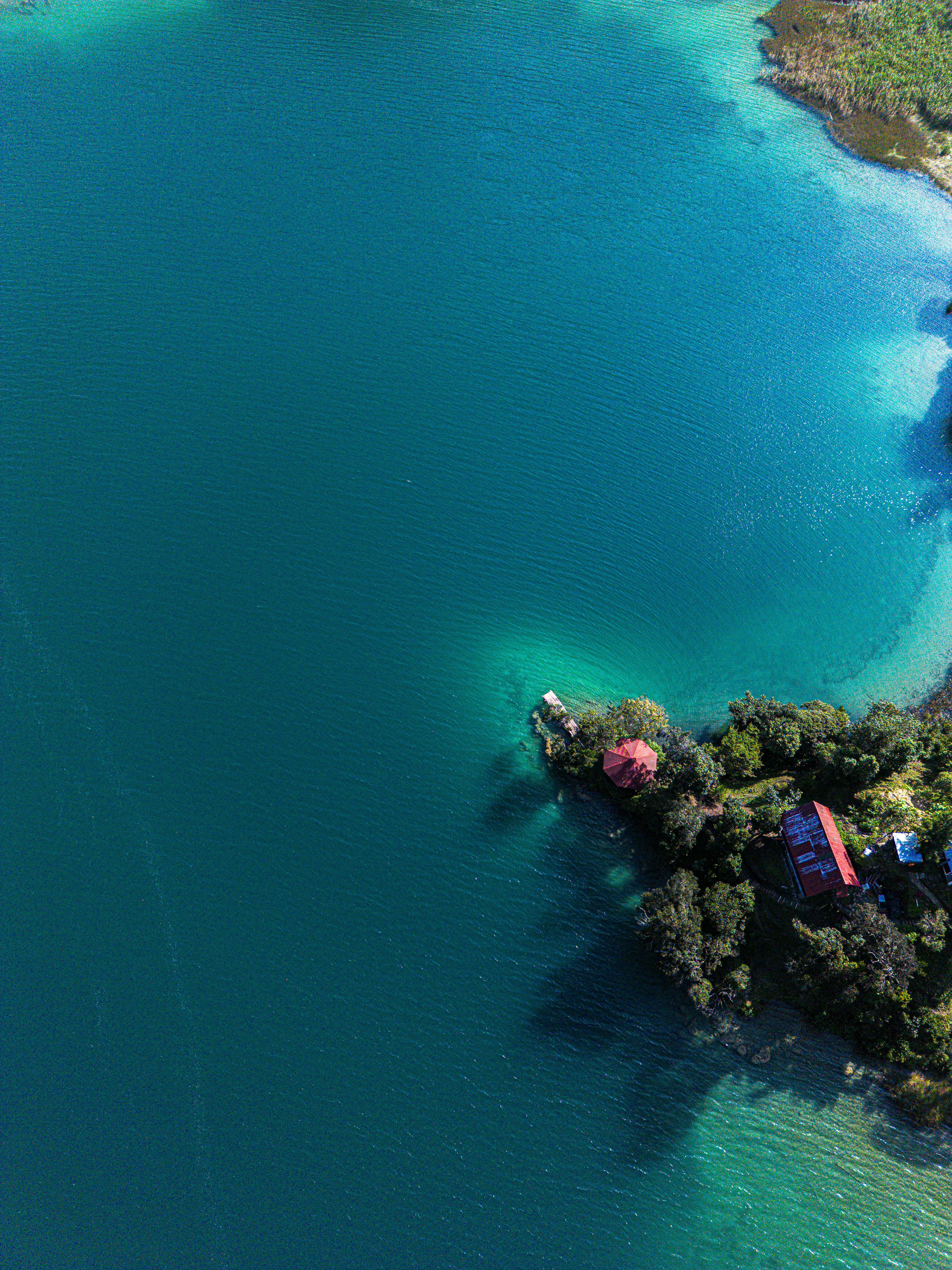 Aerial View of Serene Mexican Lake Shoreline · Free Stock Photo