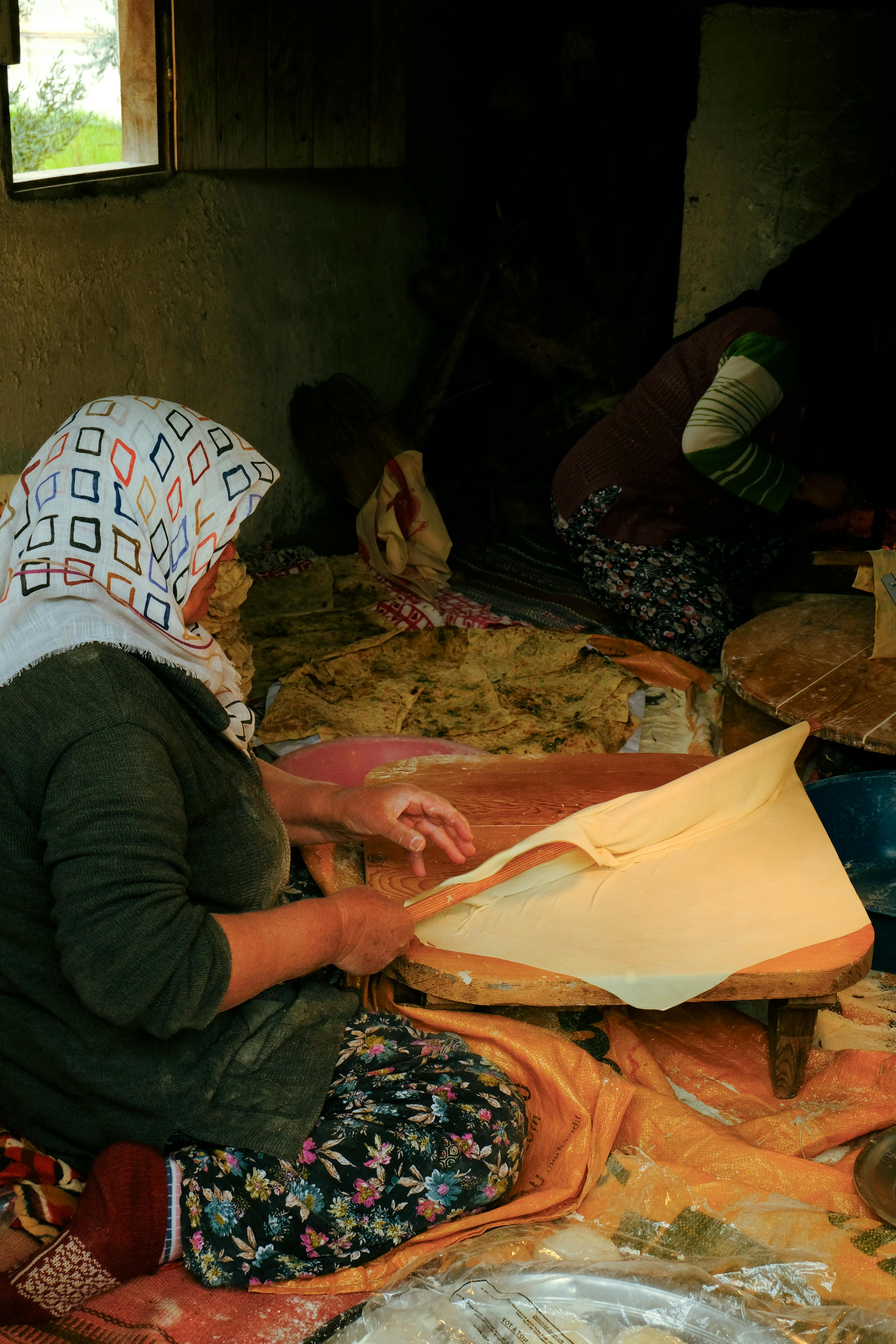 Traditional Bread Making in a Rustic Setting · Free Stock Photo