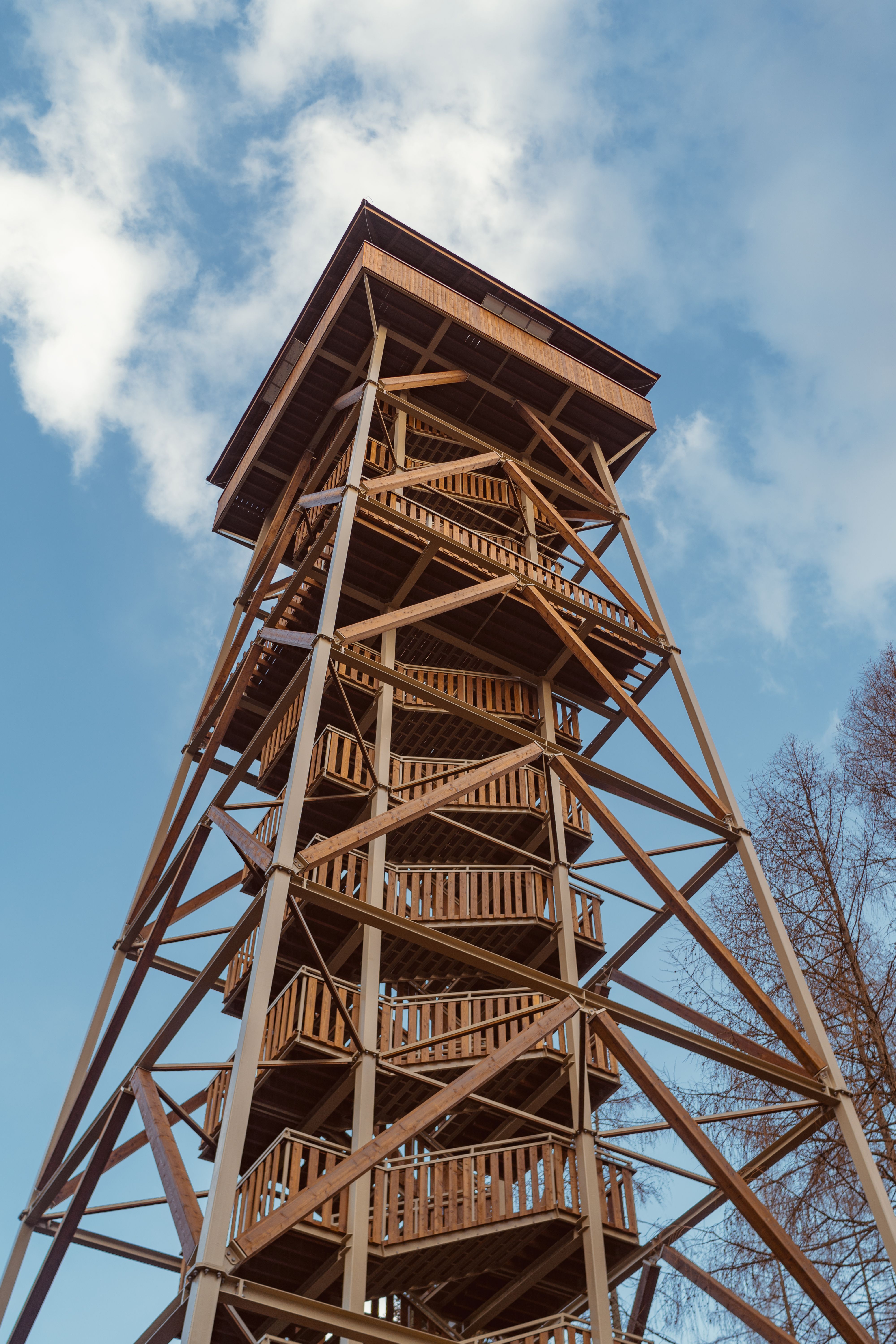 Wooden Lookout Tower Against Blue Sky · Free Stock Photo