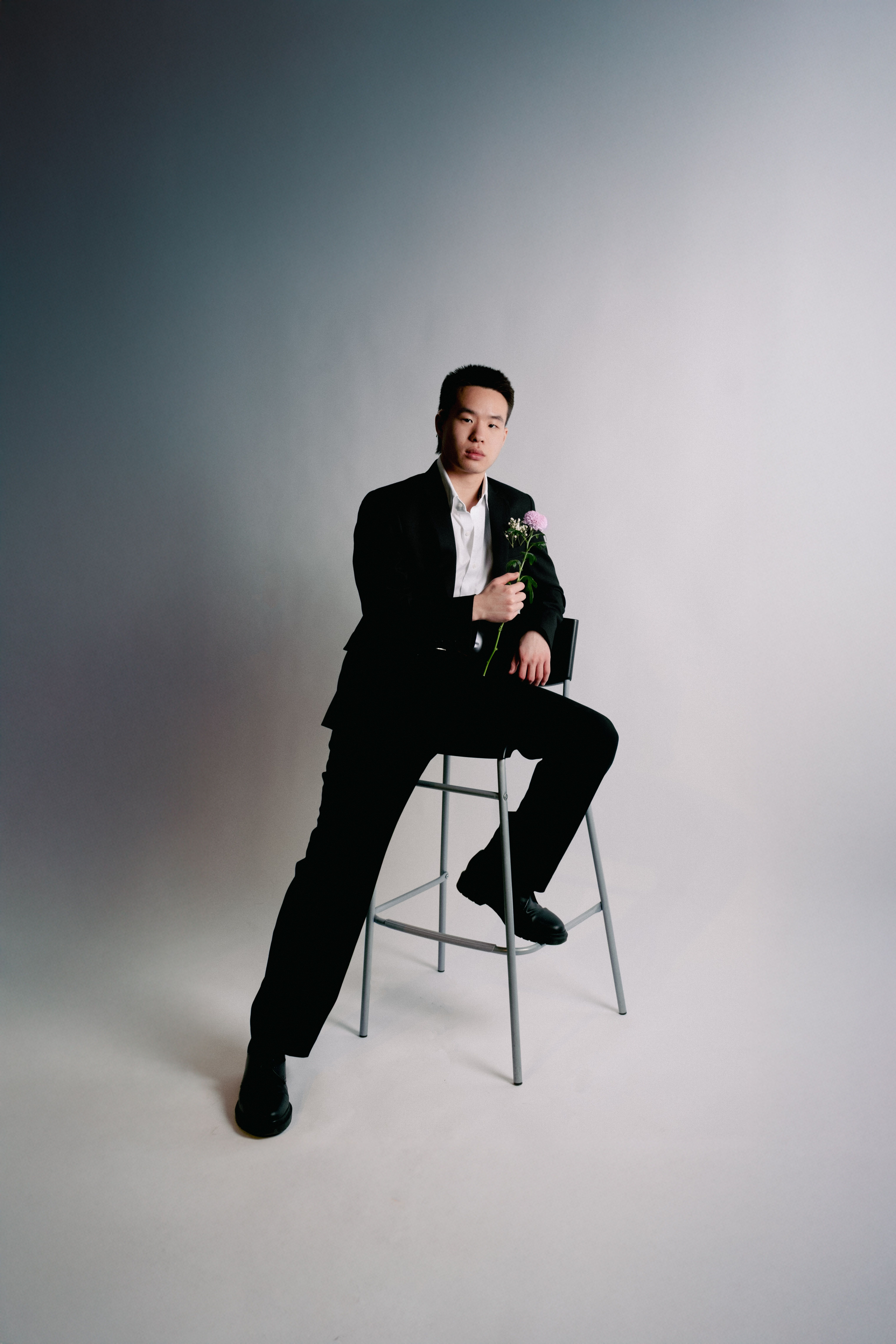 Elegant Studio Portrait of Man with Rose · Free Stock Photo