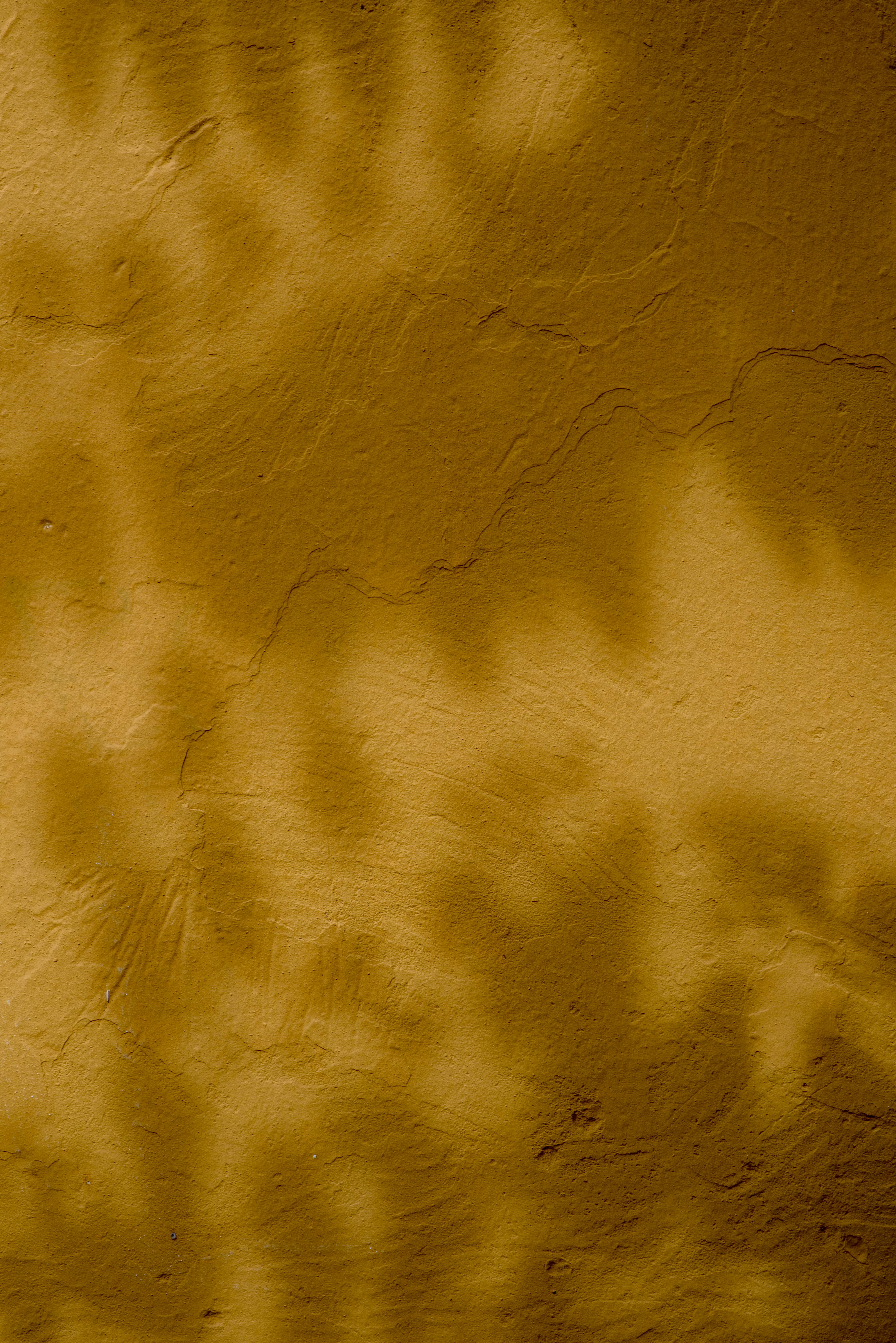 Abstract Shadow Patterns on Textured Wall · Free Stock Photo