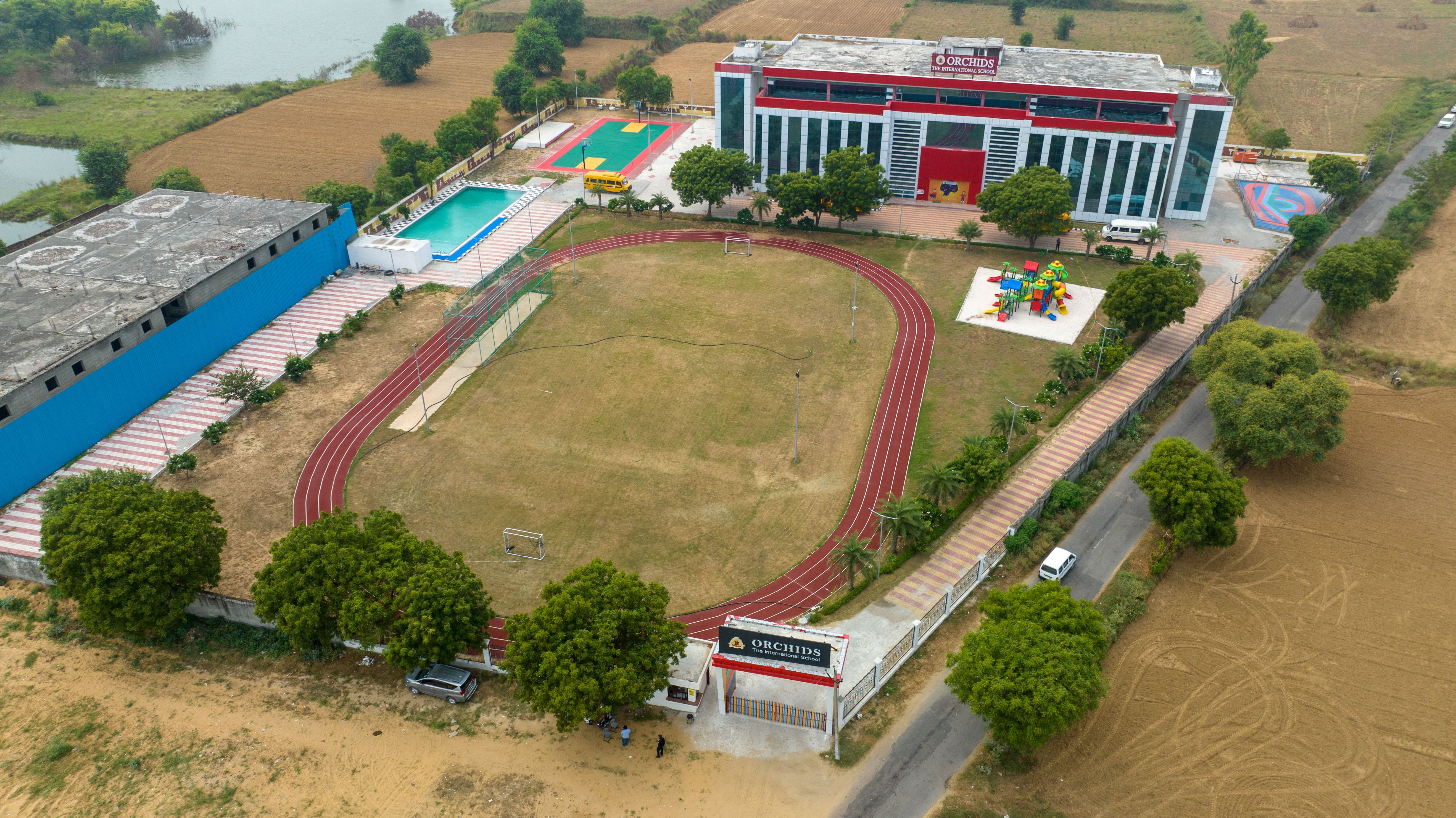 Aerial View of School Campus with Sports Facilities · Free Stock Photo