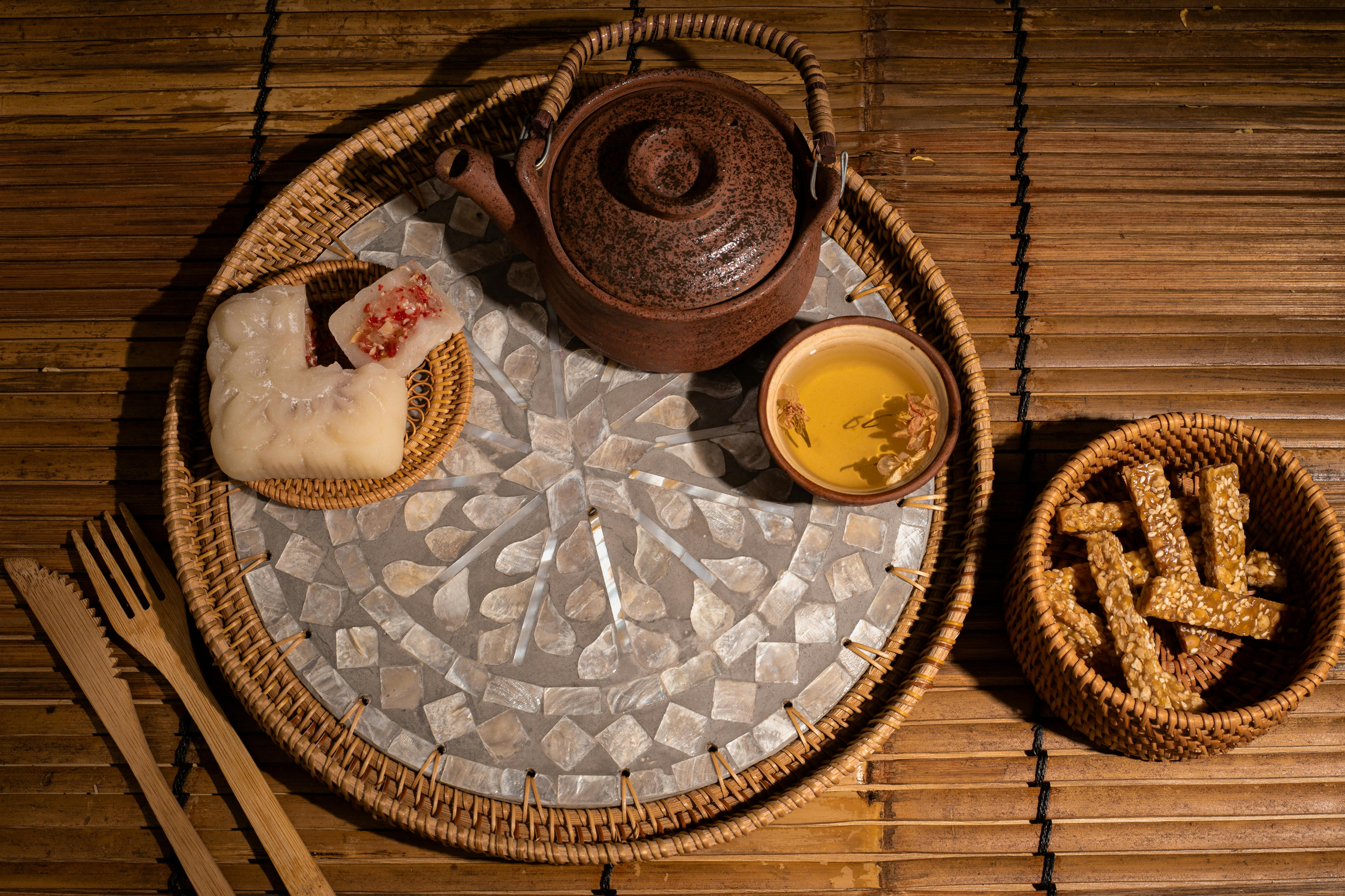 Rustic Tea Set with Traditional Asian Snacks · Free Stock Photo