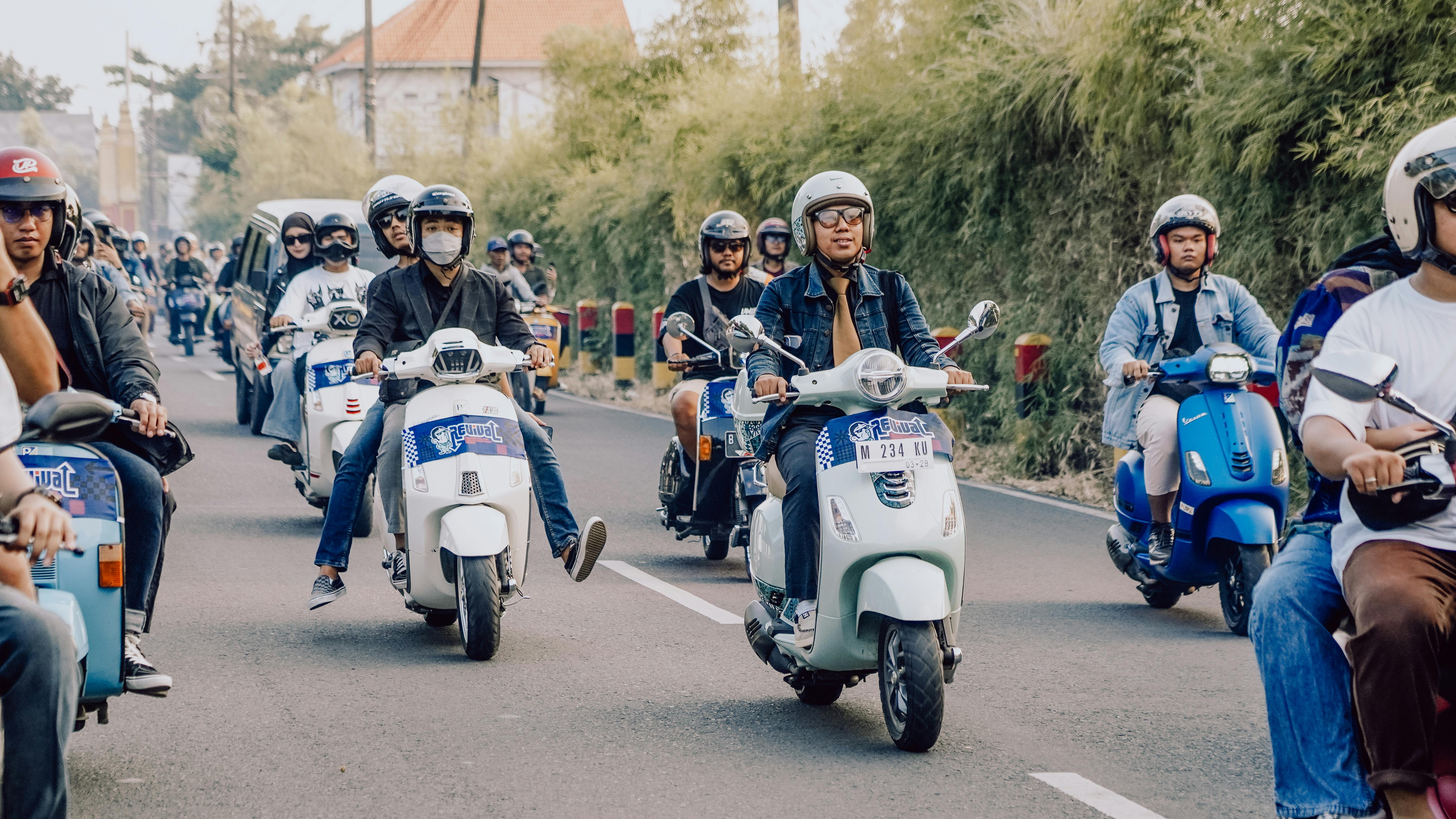 Group of Scooter Riders on East Java Road · Free Stock Photo